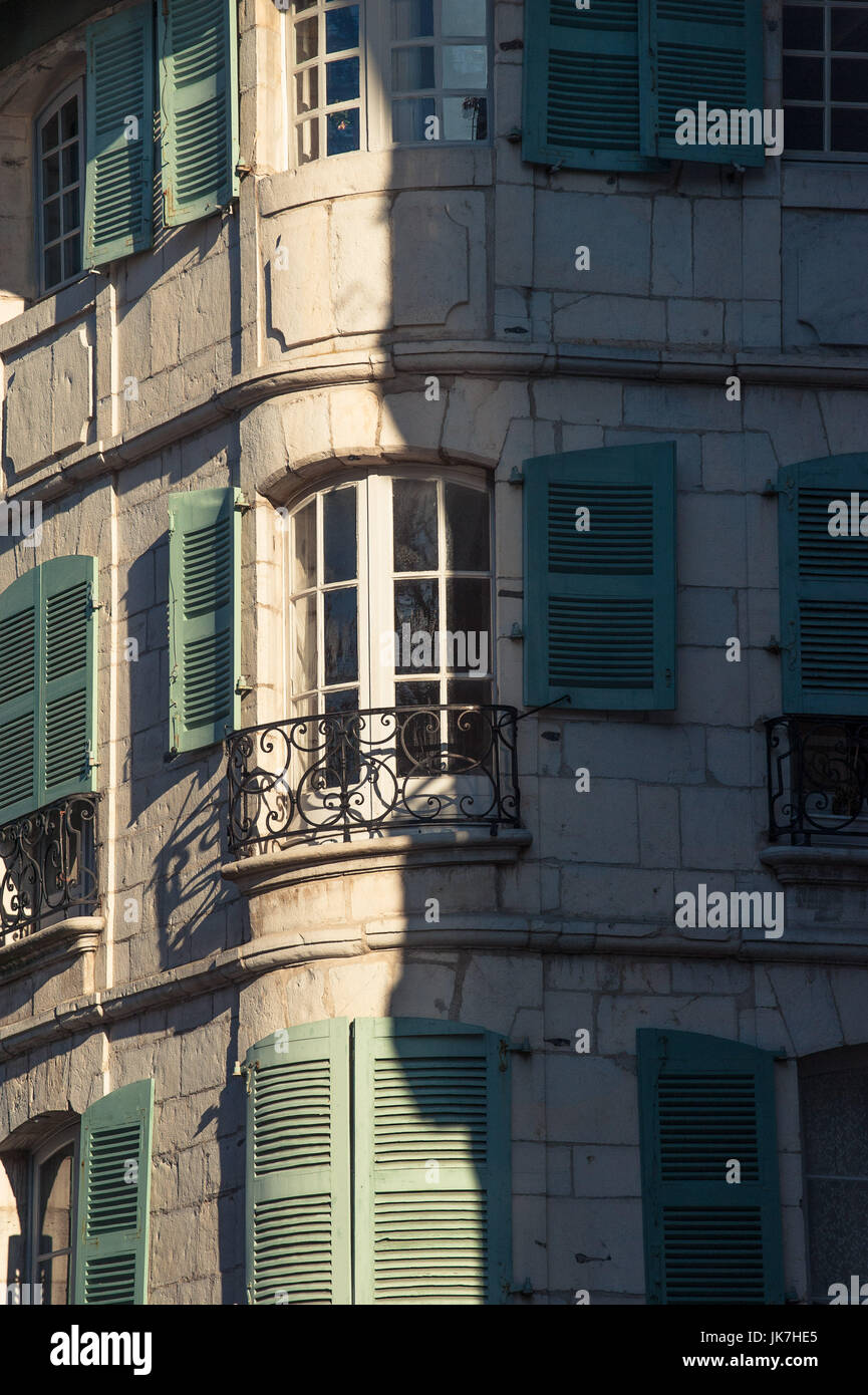 Typical french windows with colorful shutters Stock Photo - Alamy