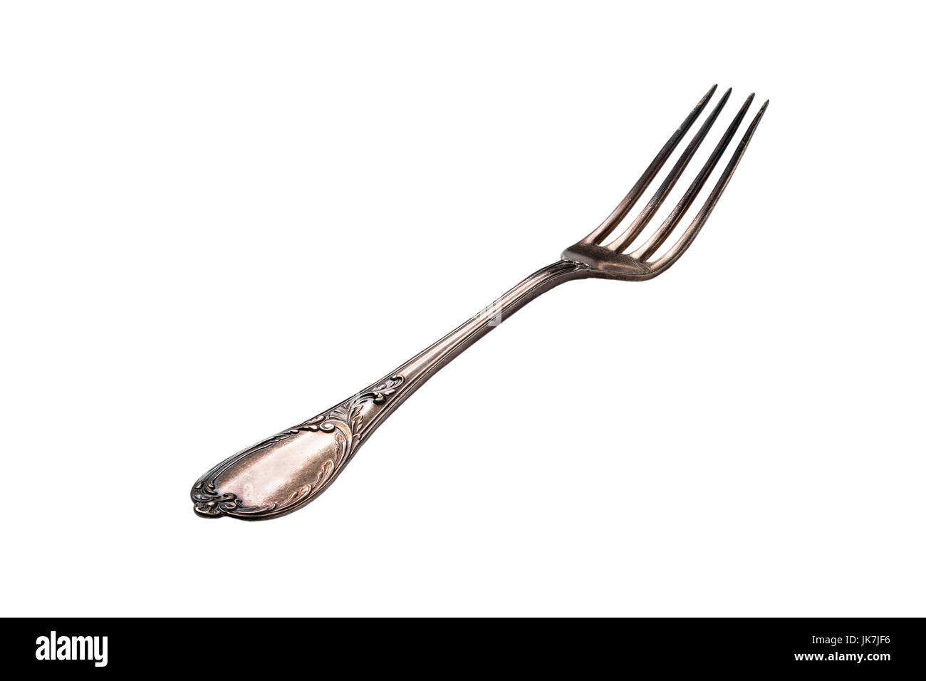 single old antique cutlery fork isolated on white background, clipping ...