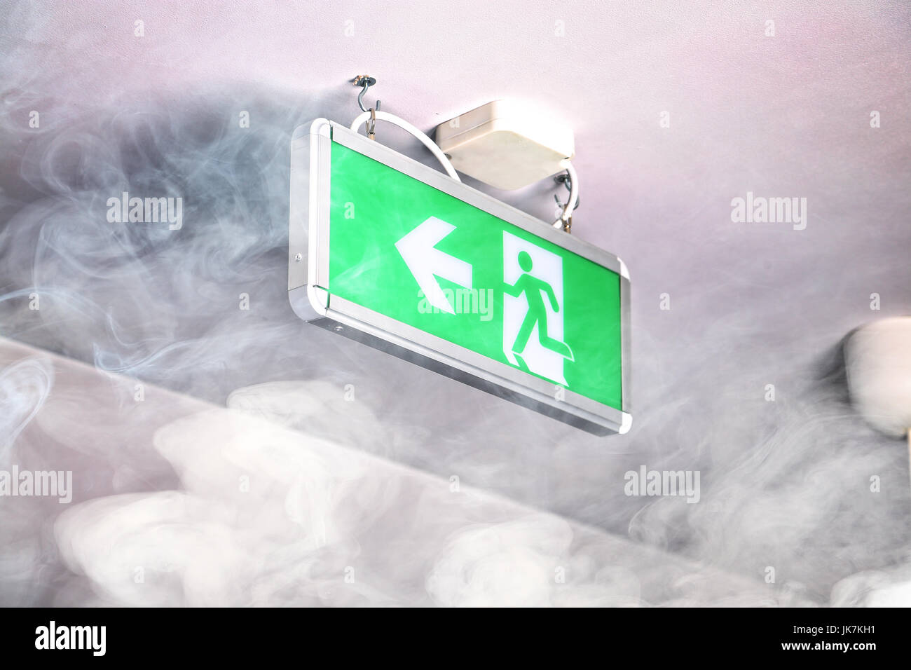 Smoke in the building and escape route Stock Photo - Alamy