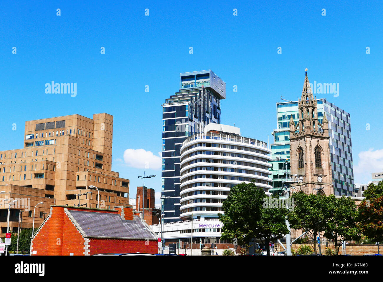 City skyline showing new high rise buildings and the old Our Lady and ...