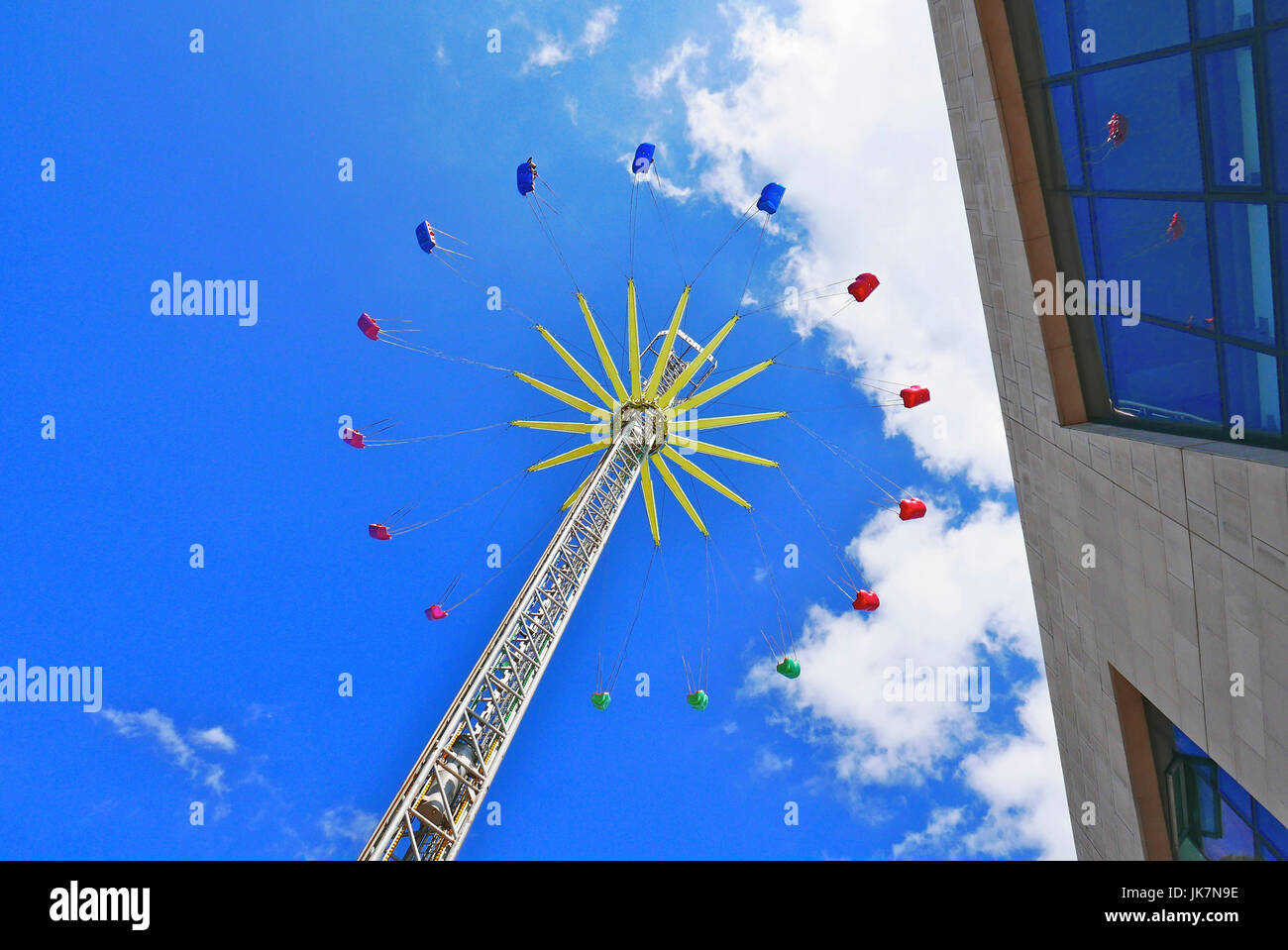 Aerial roundabout ride on Pier Head Village amusement park,Liverpool,UK ...