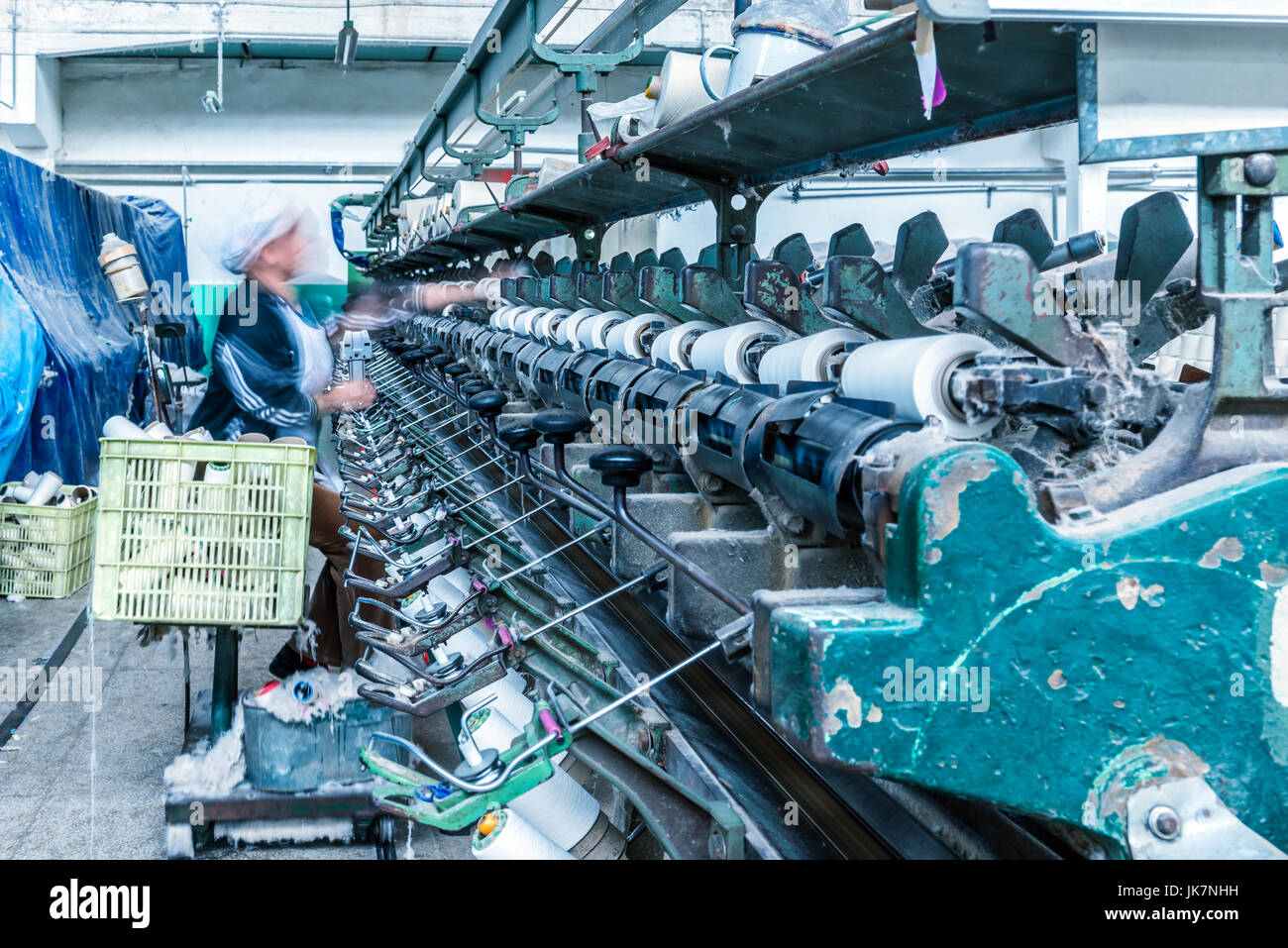Textile mill workshop interior, working female workers Stock Photo - Alamy