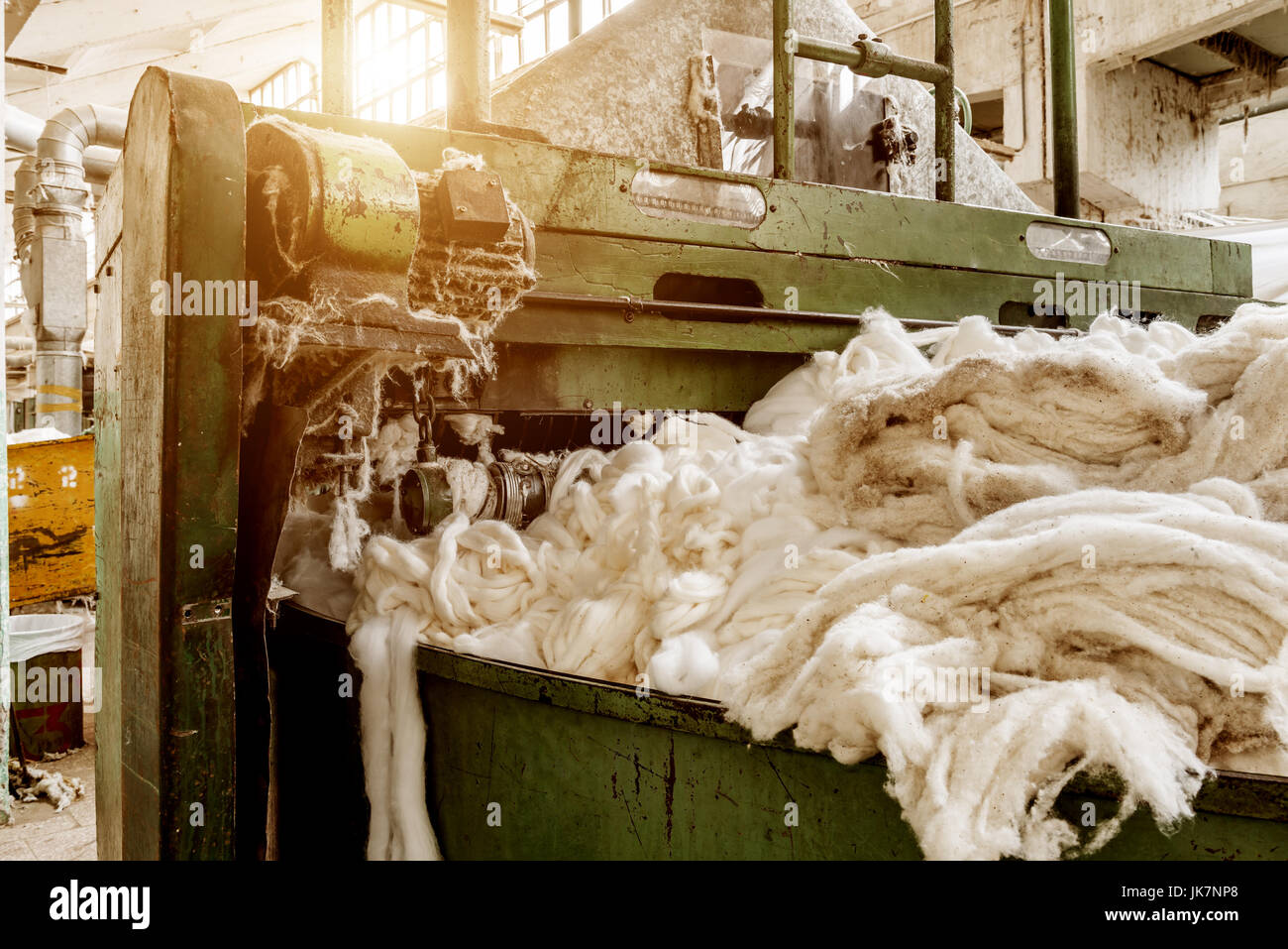 Features of carding machine in textile mill Stock Photo - Alamy