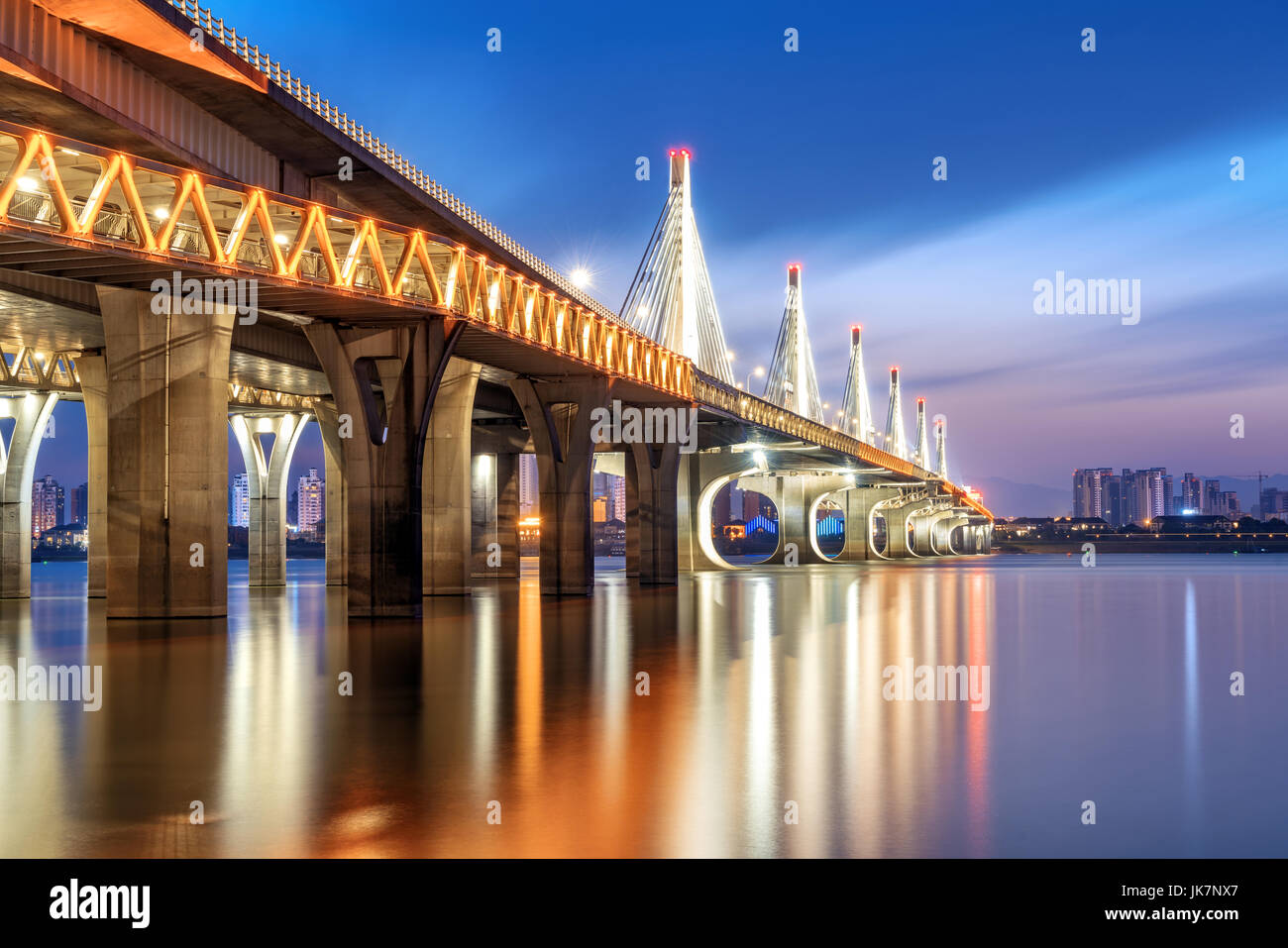 City of landmark buildings, modern bridge night view, China Nanchang ...
