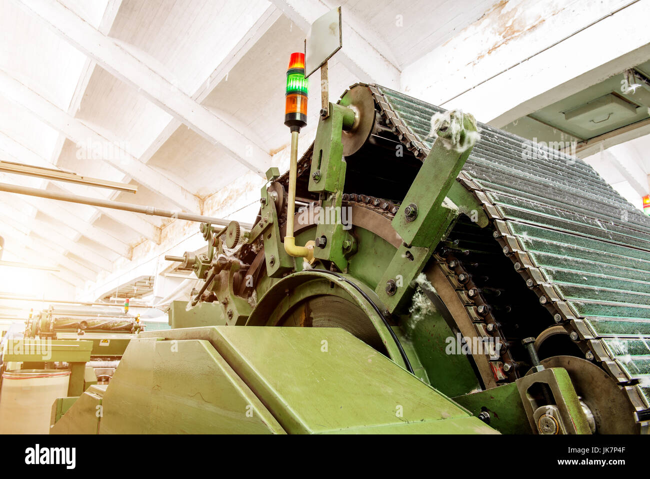 Features of carding machine in textile mill Stock Photo - Alamy