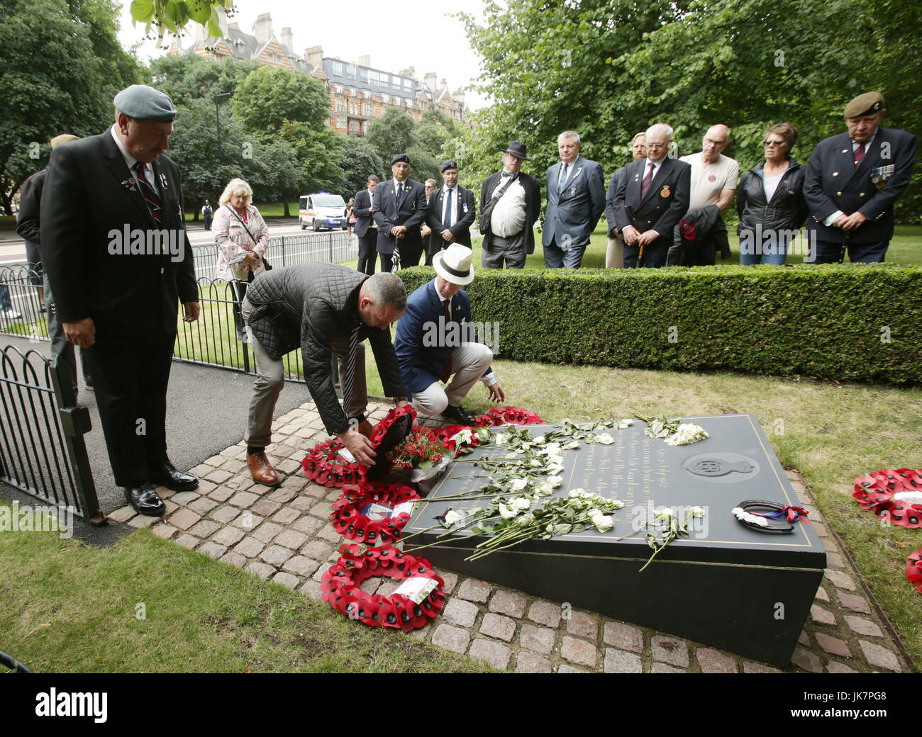 Mark Tipper (centre), whose 19-year-old brother Simon died in the blast ...