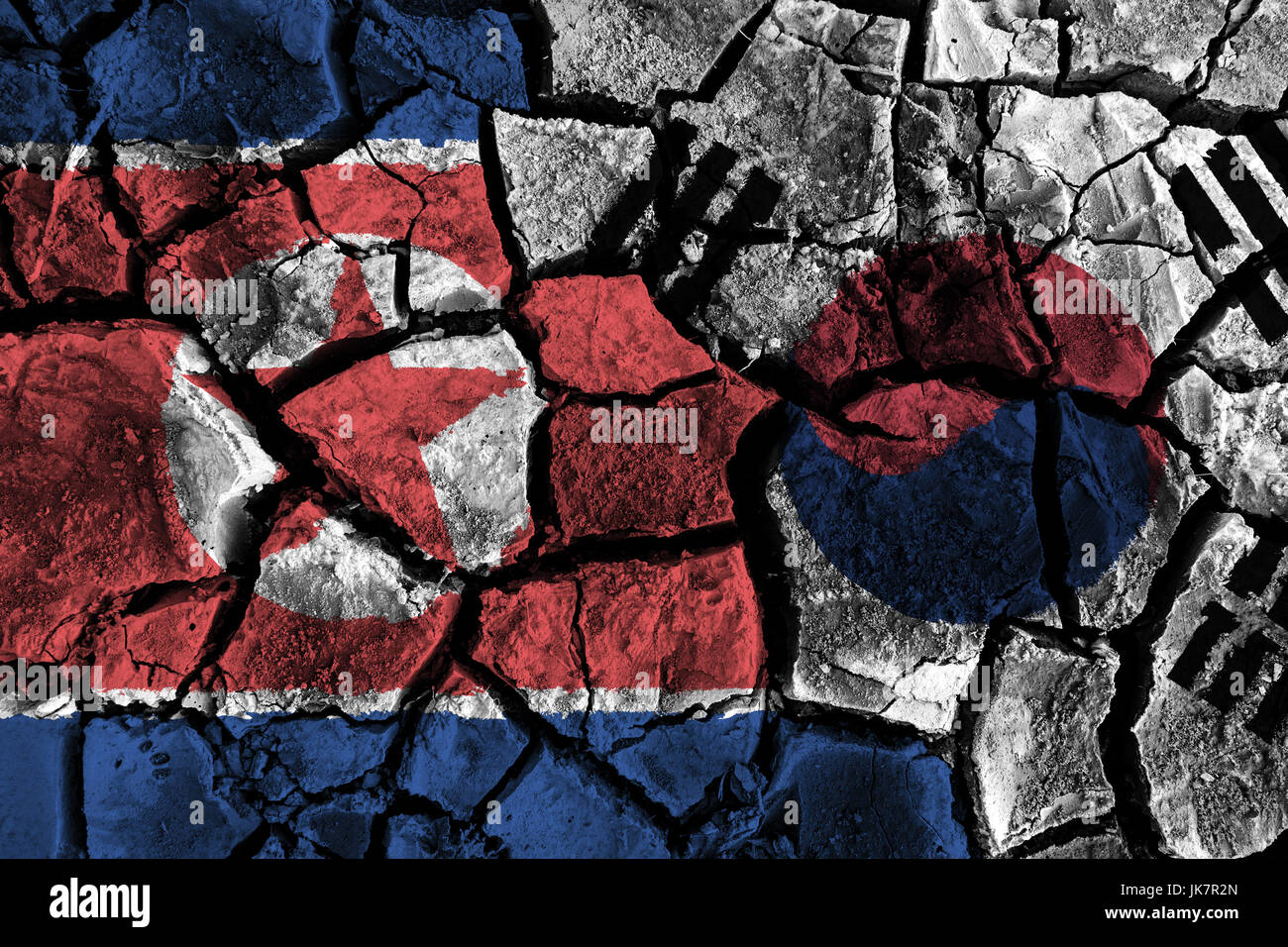 North and south korea flag on cracked ground . Confliction and crisis ...