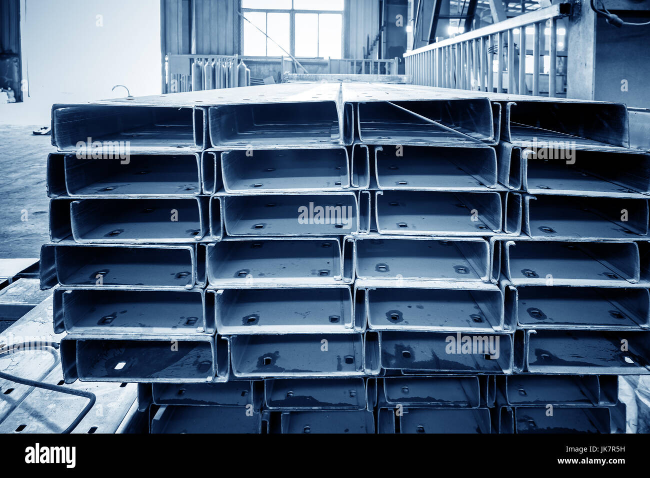 Steel factory floor, stacked with a lot of steel Stock Photo - Alamy
