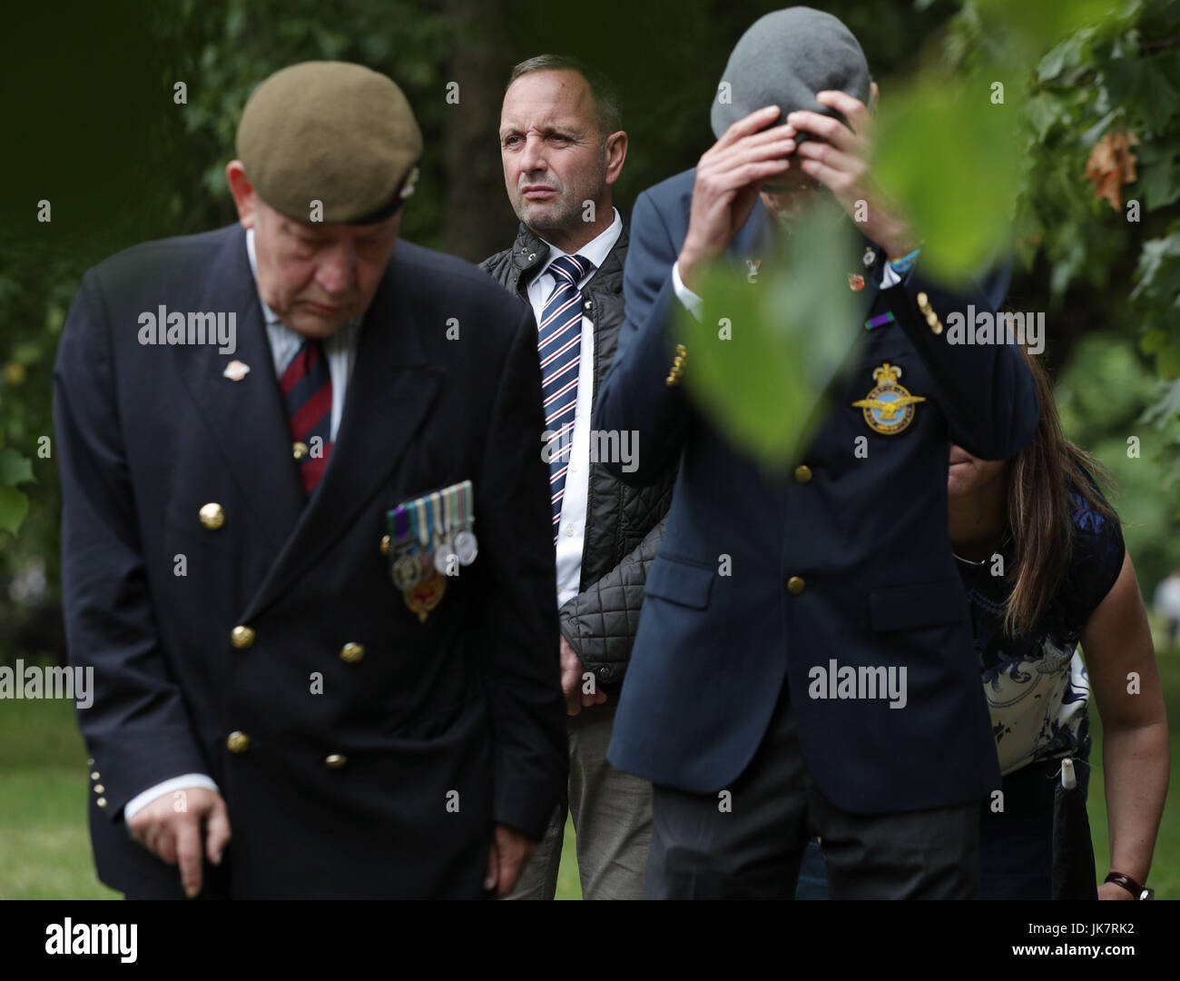 Mark Tipper (centre), whose 19-year-old brother Simon died in the blast ...