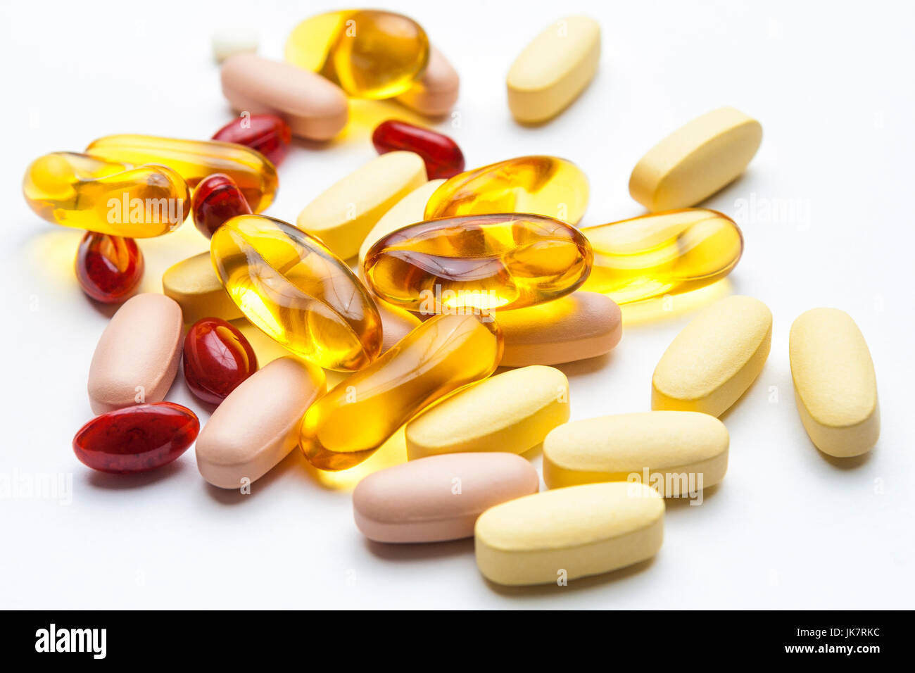 Assortment of dietary nutritional supplements isolated on white ...