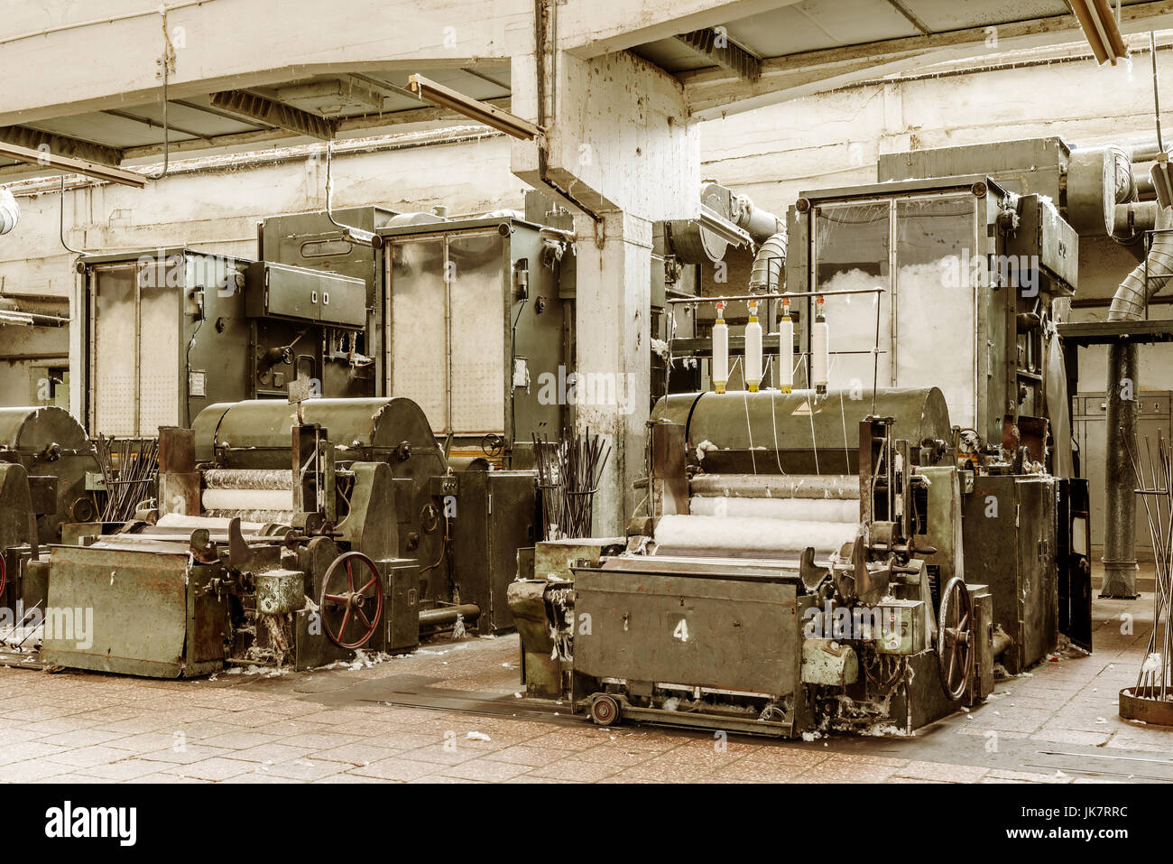Features of carding machine in textile mill Stock Photo - Alamy