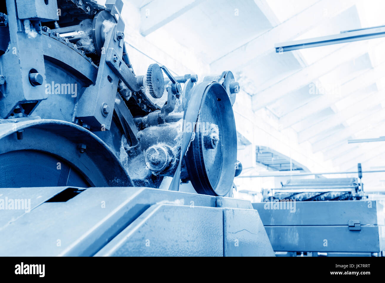 Features of carding machine in textile mill Stock Photo - Alamy
