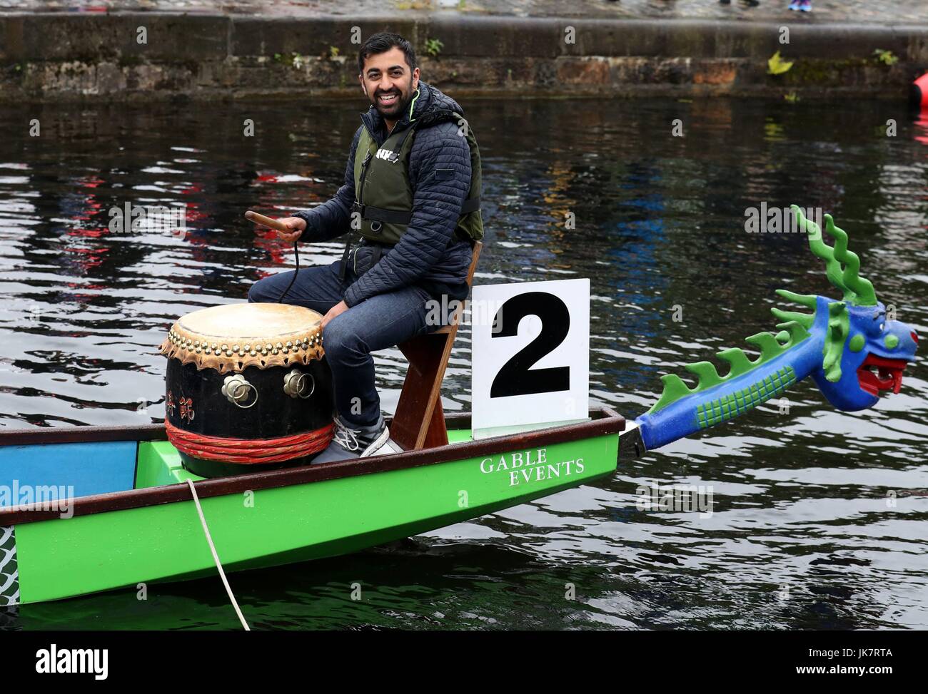 Transport Minister Humza Yousaf beats the drum before joining one of ...