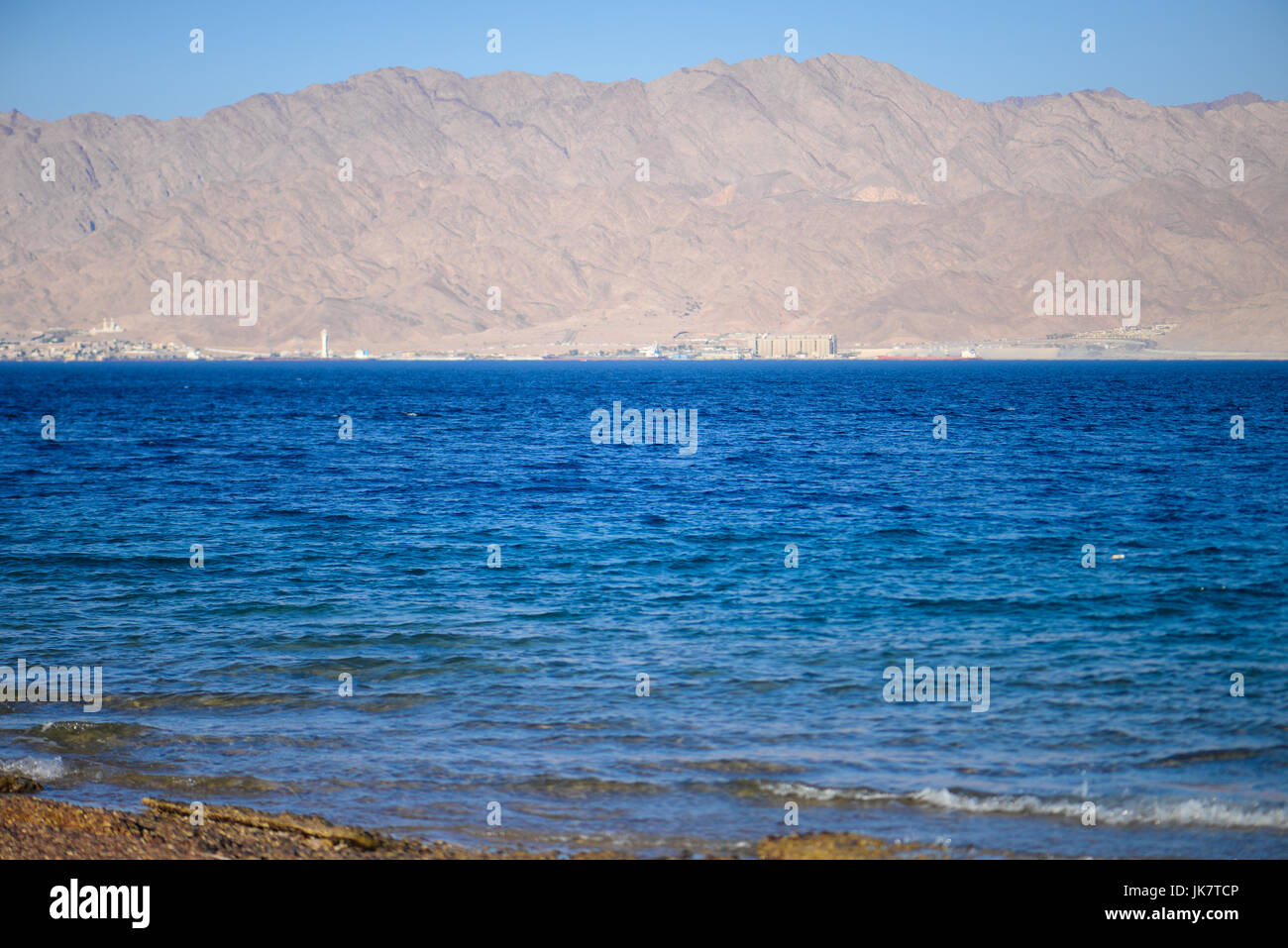 red sea beach during summer days with view of jordan mountains Stock ...