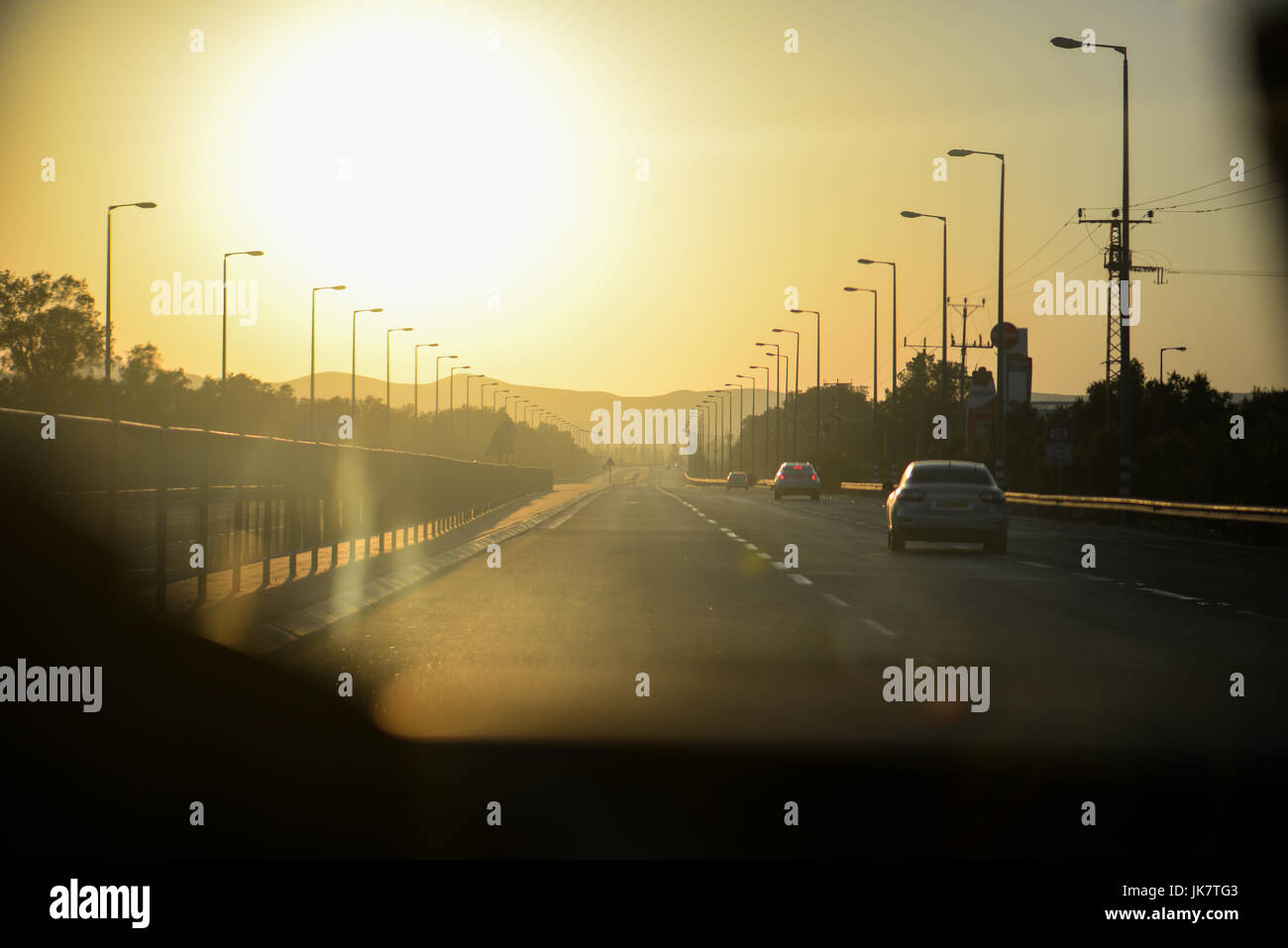 Driving during sunset country road hi-res stock photography and images ...