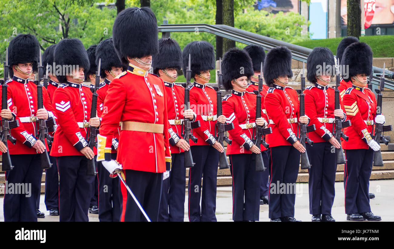 Canada Ceremonial Guard hold their guns before a welcoming ceremony Charles, Prince of Wales on ...