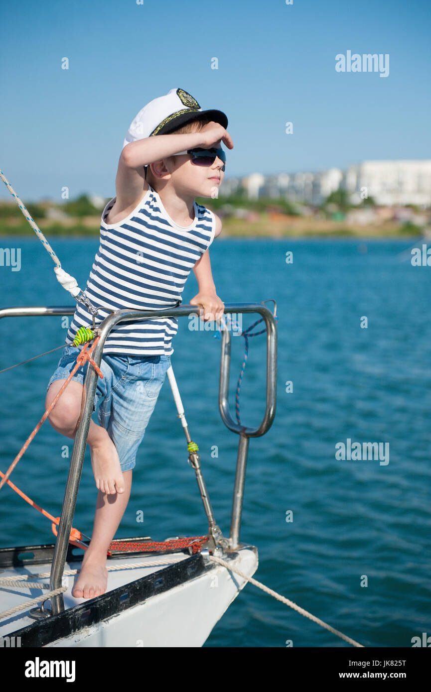 cute little captain small boy wearing captain hat and trendy sunglasses ...