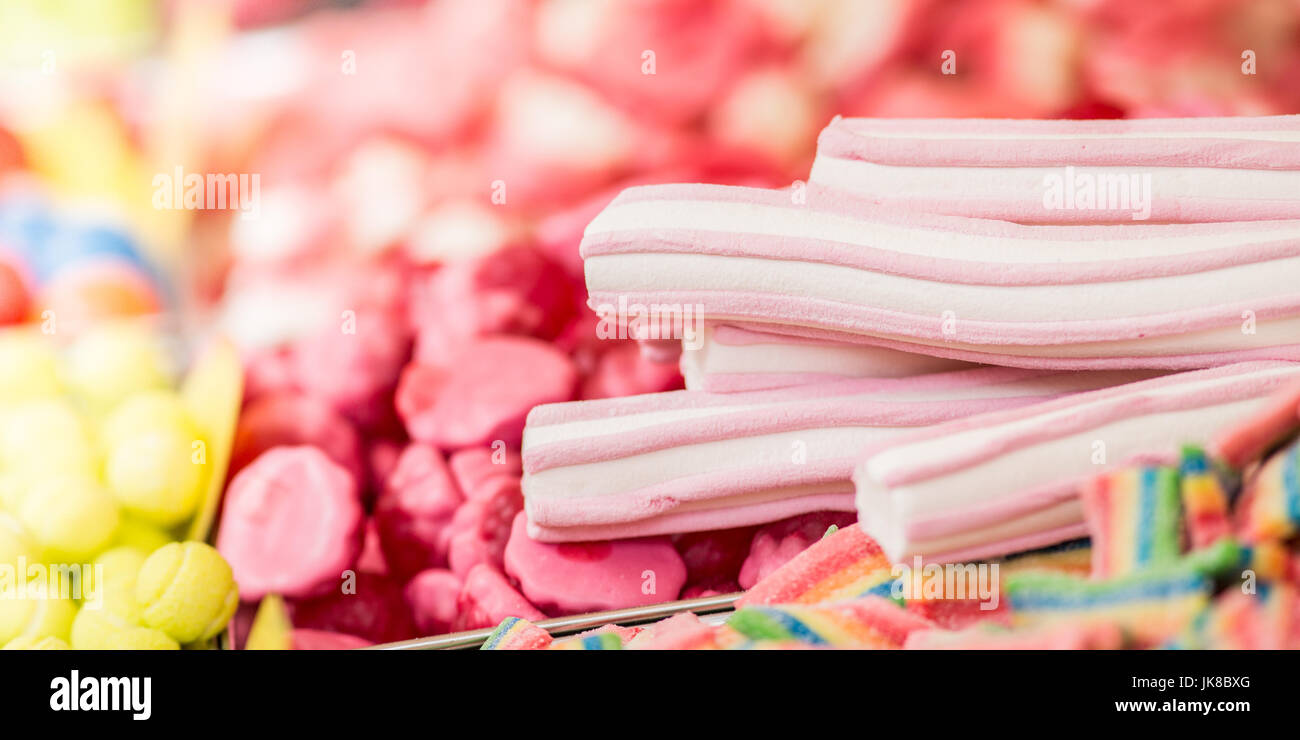 Vibrant and multi colored mixed sweets in a street market Stock Photo ...