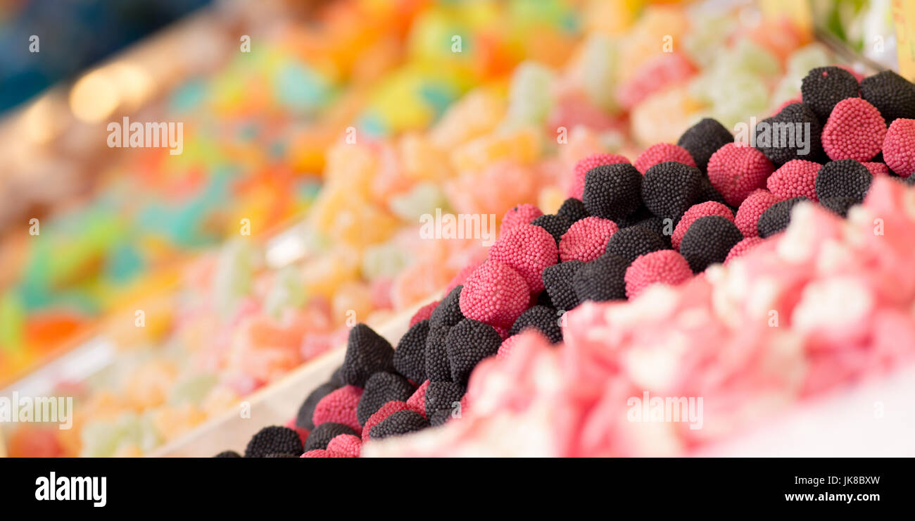 Vibrant and multi colored mixed sweets in a street market Stock Photo ...