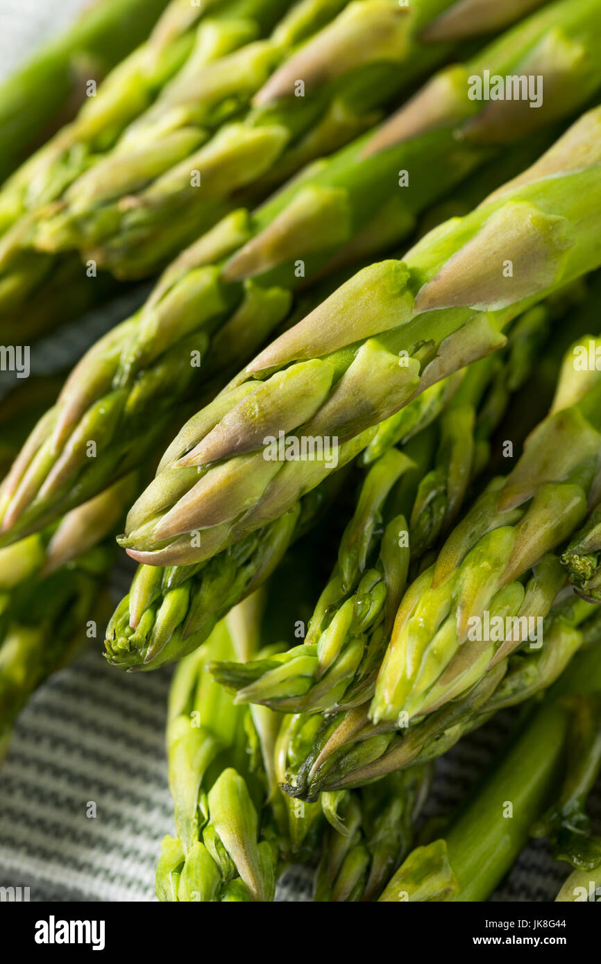 Raw Green Organic Asparagus Spears REady to Cook Stock Photo - Alamy