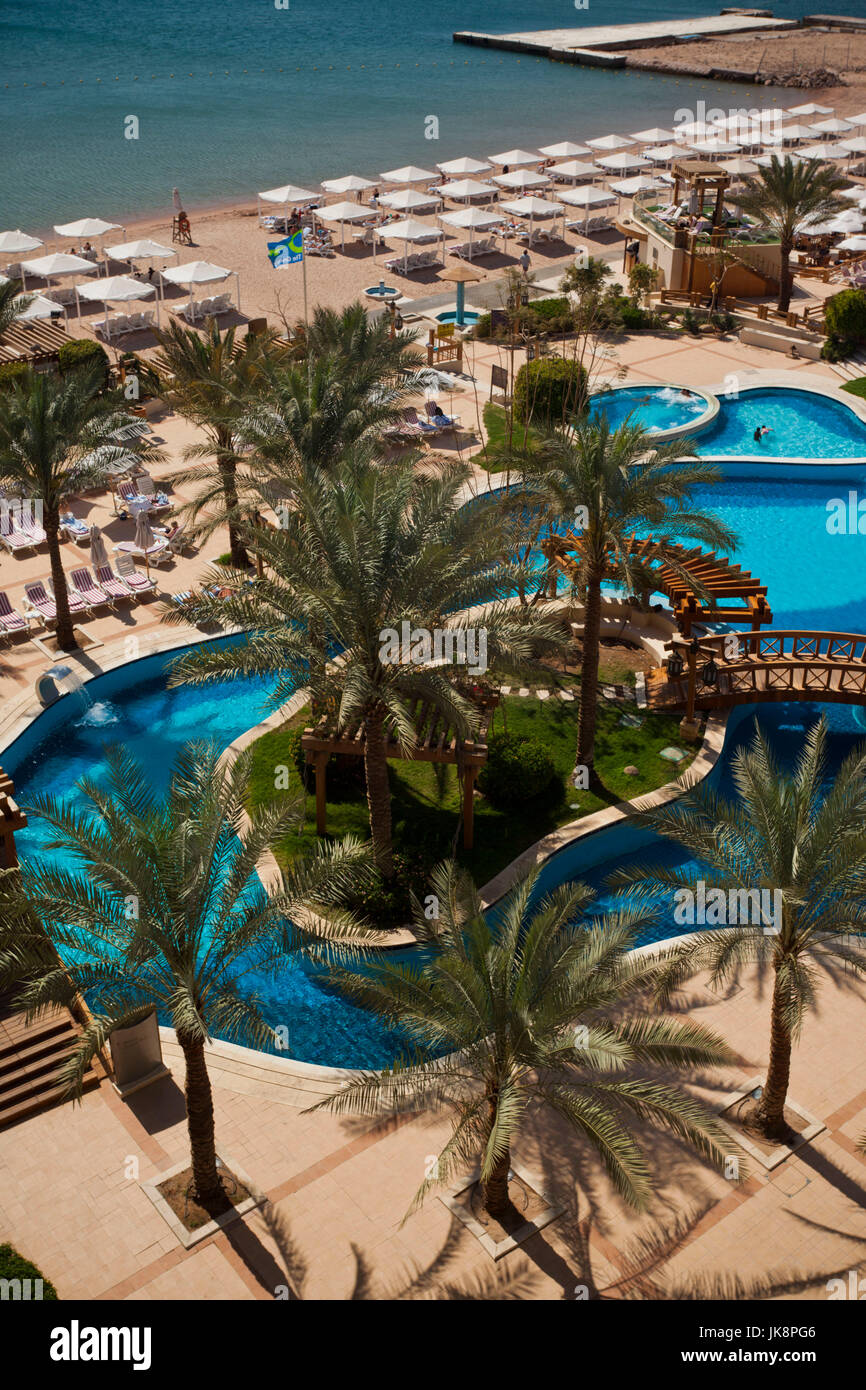 Jordan, Aqaba, elevated view of hotel swimming pool by Red Sea Stock ...
