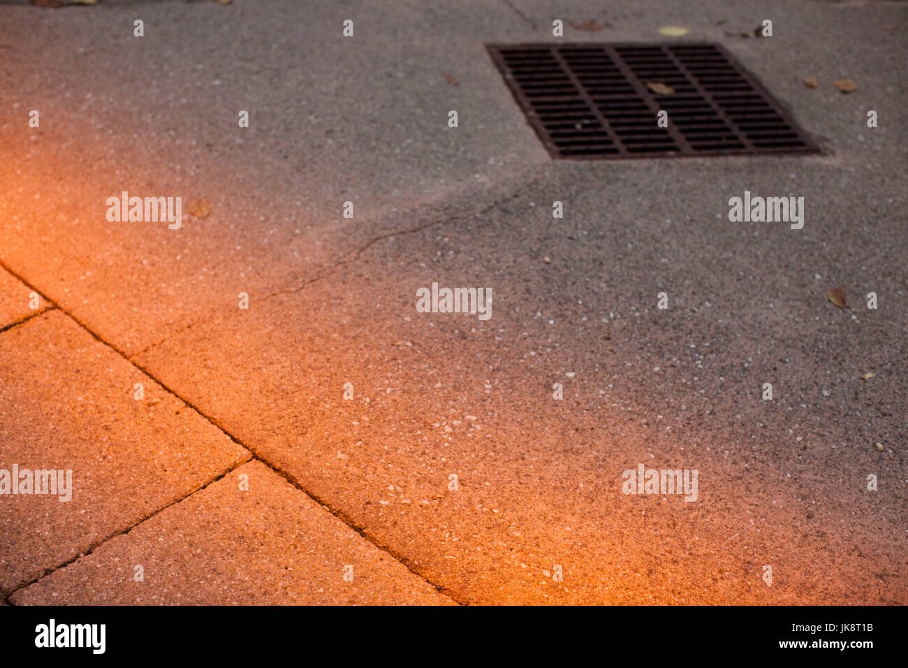Light beam on street near street drain hi-res stock photography and ...
