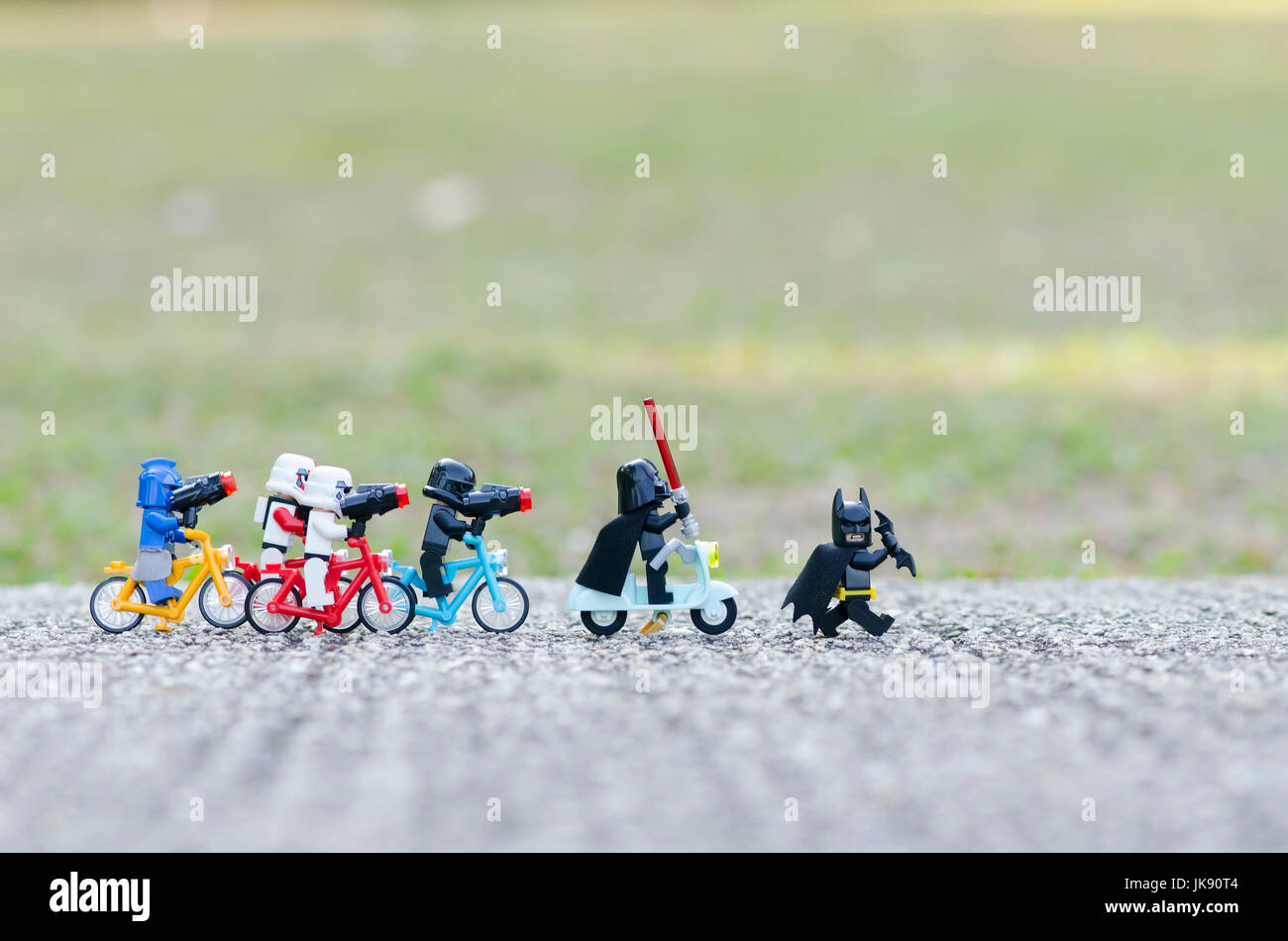 lego darth vader and clone troopers chasing batman Stock Photo - Alamy