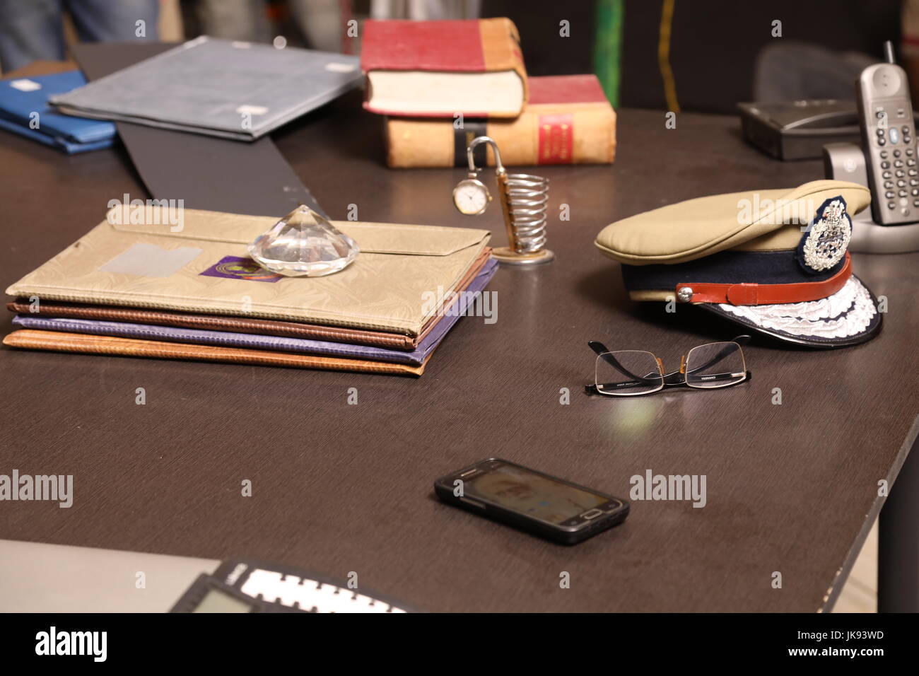 Police Hat on the table Stock Photo - Alamy