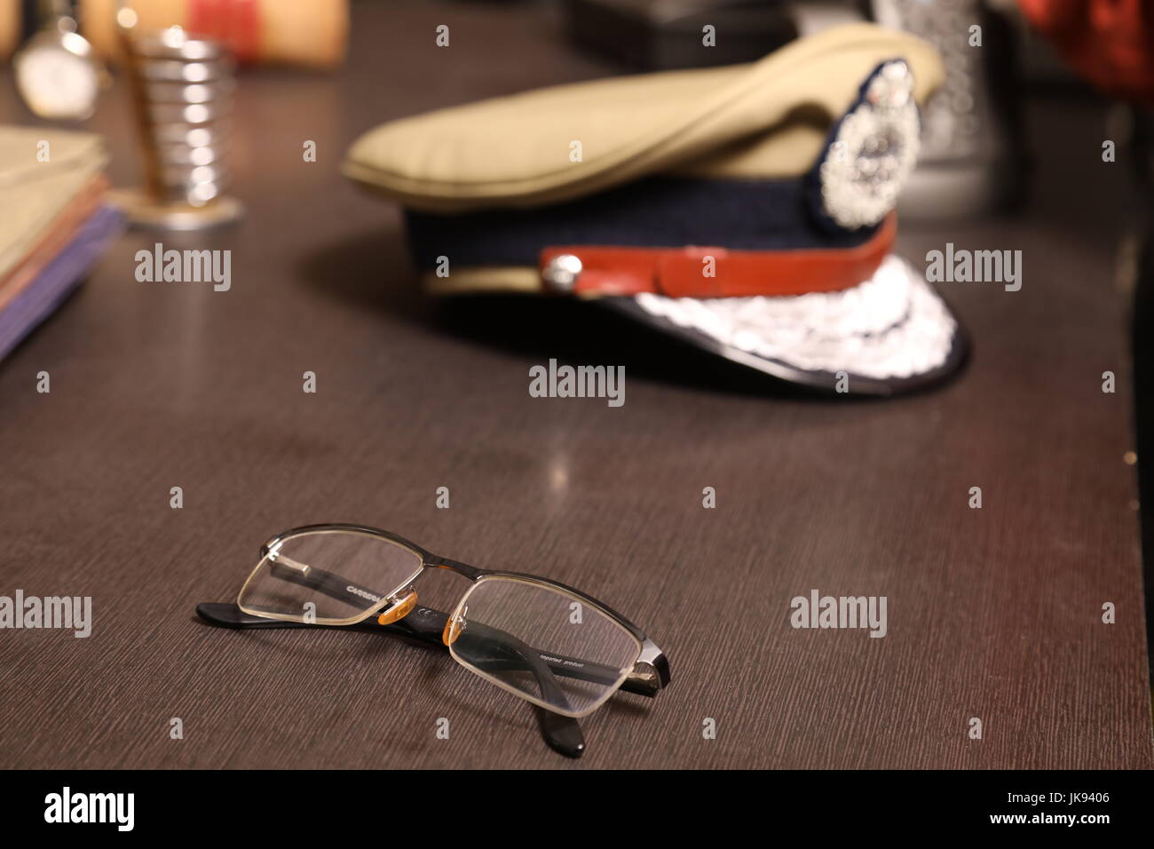 Police Hat on the table Stock Photo - Alamy