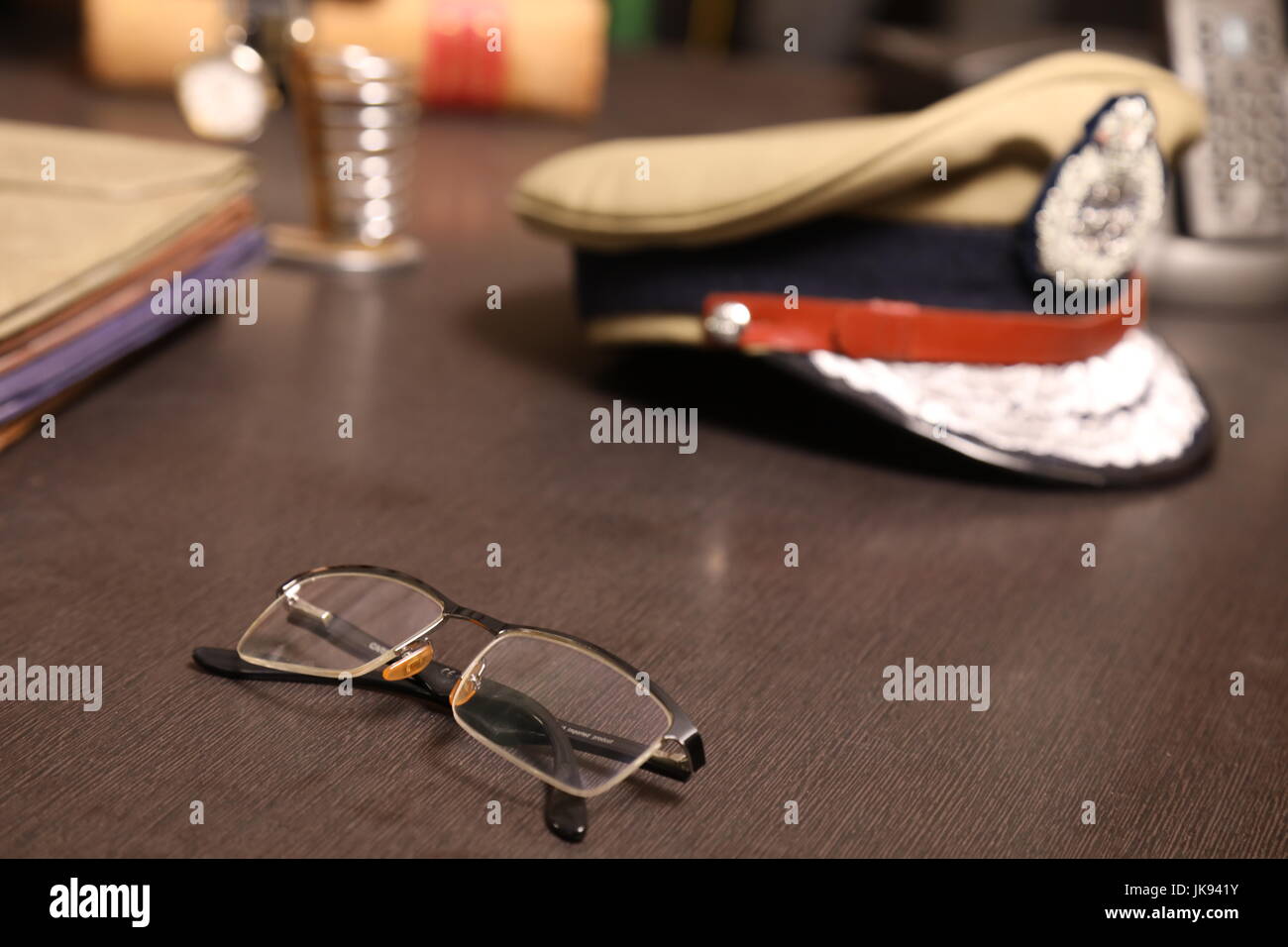 Police Hat on the table Stock Photo - Alamy