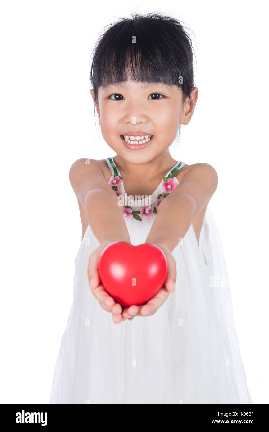 Asian Little Chinese Girl Holding Red Heart in isolated White ...