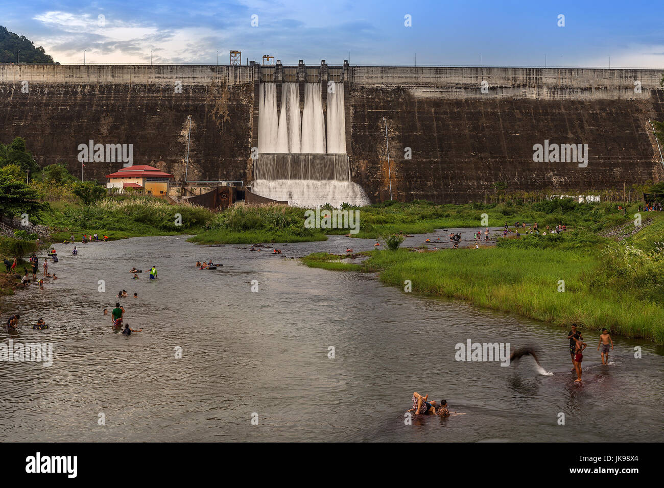 beautiful concrete dam and life in twilight time with reflection on dam ...