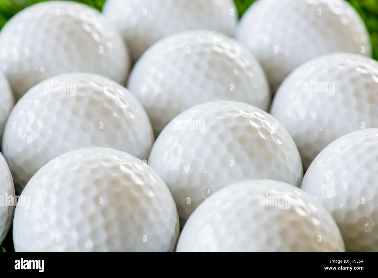 golf ball row Stock Photo - Alamy