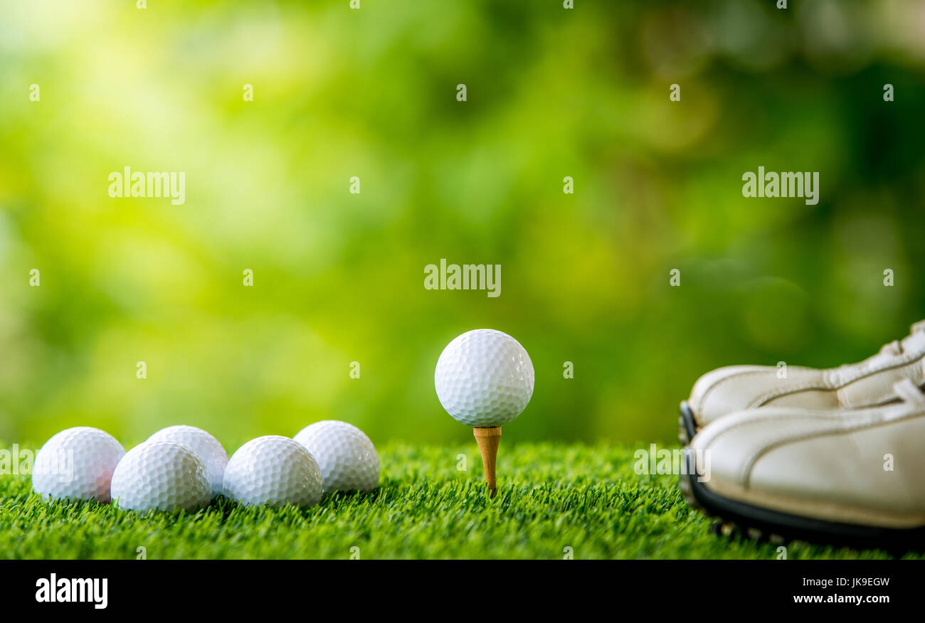 golf ball on tee ready to practice Stock Photo - Alamy