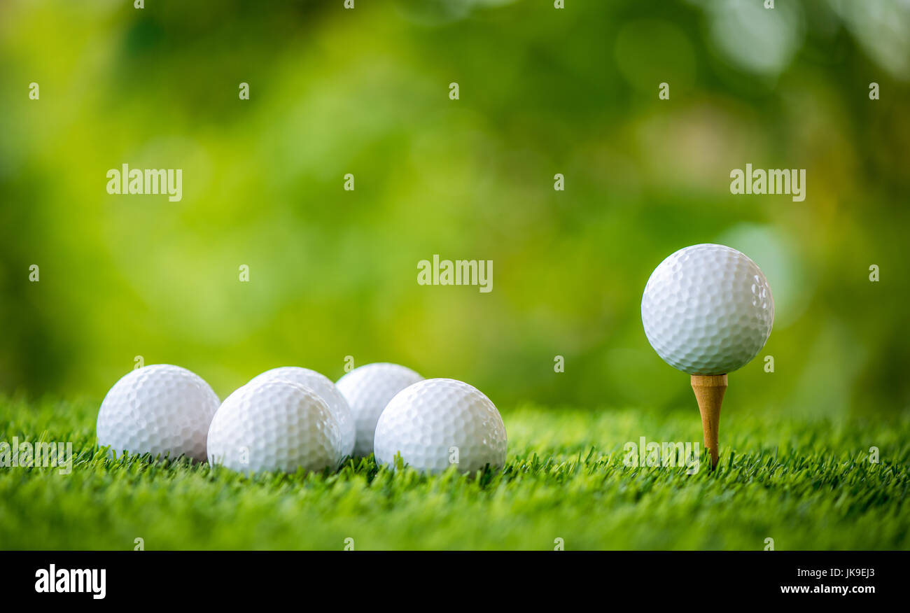 golf ball on tee ready to practice Stock Photo - Alamy