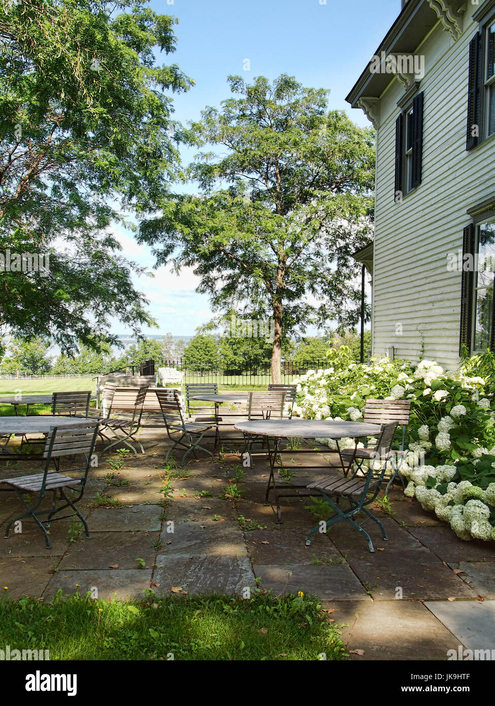 pretty old fashioned oudoor patio Stock Photo - Alamy