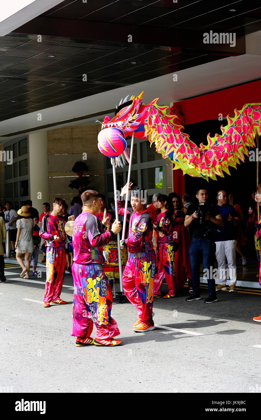 Chinese dragon dancers with the Dragon and ball Stock Photo - Alamy