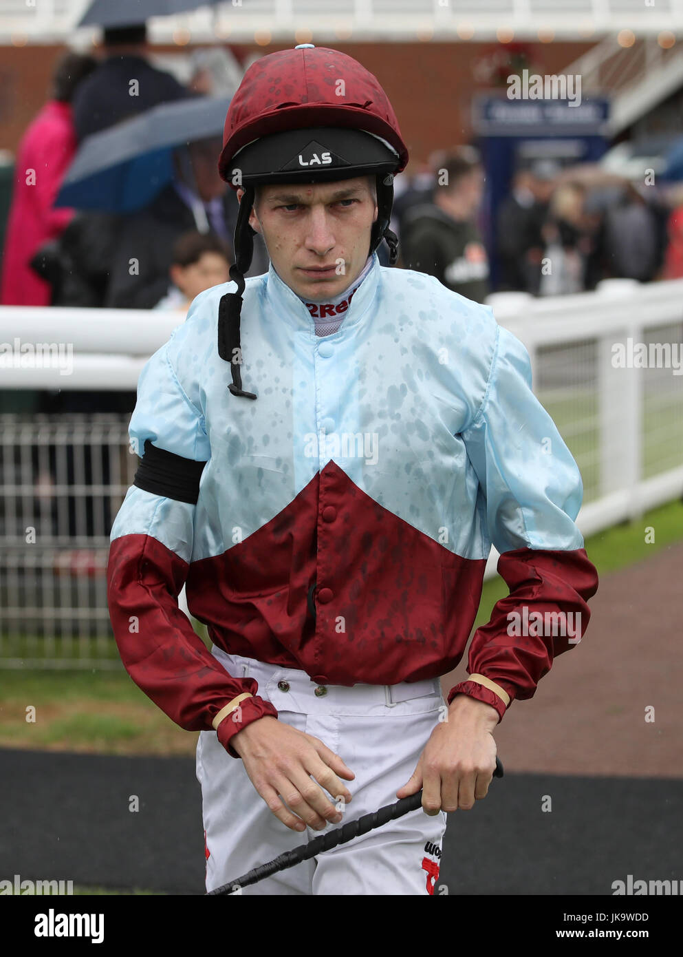 Luke Morris walks into the parade ring before his ride on Omran wearing ...