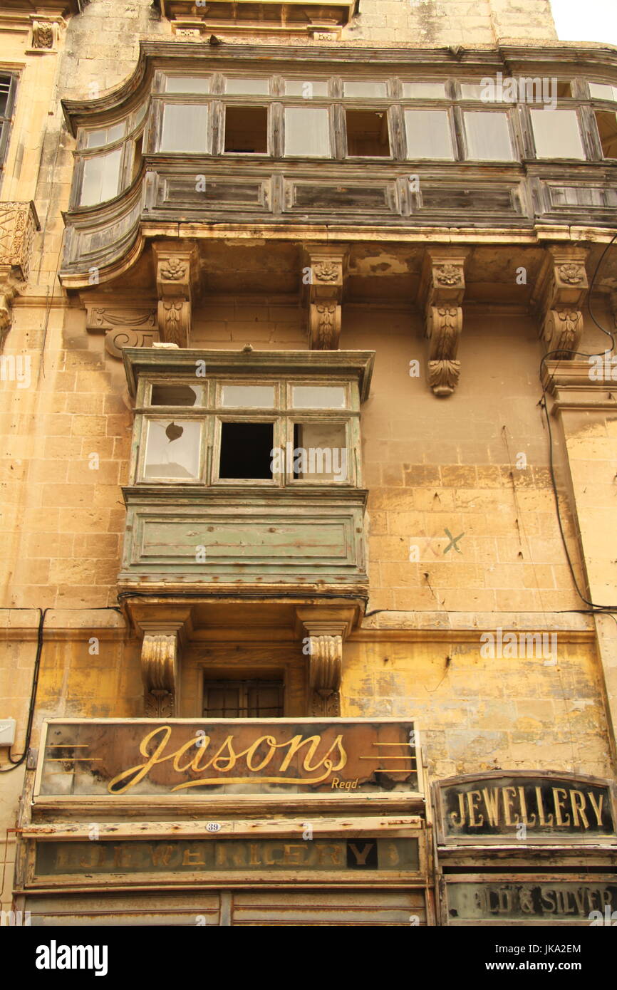 street front, Valetta with balconies and street sign Stock Photo - Alamy