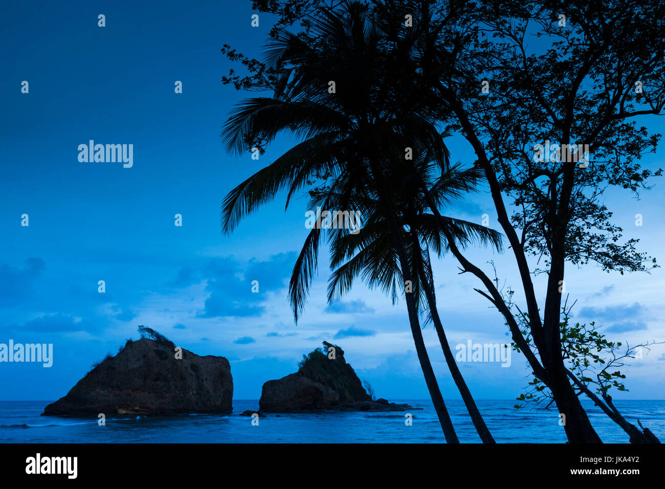 Dominica, Calibishie, shore rocks, dawn Stock Photo - Alamy
