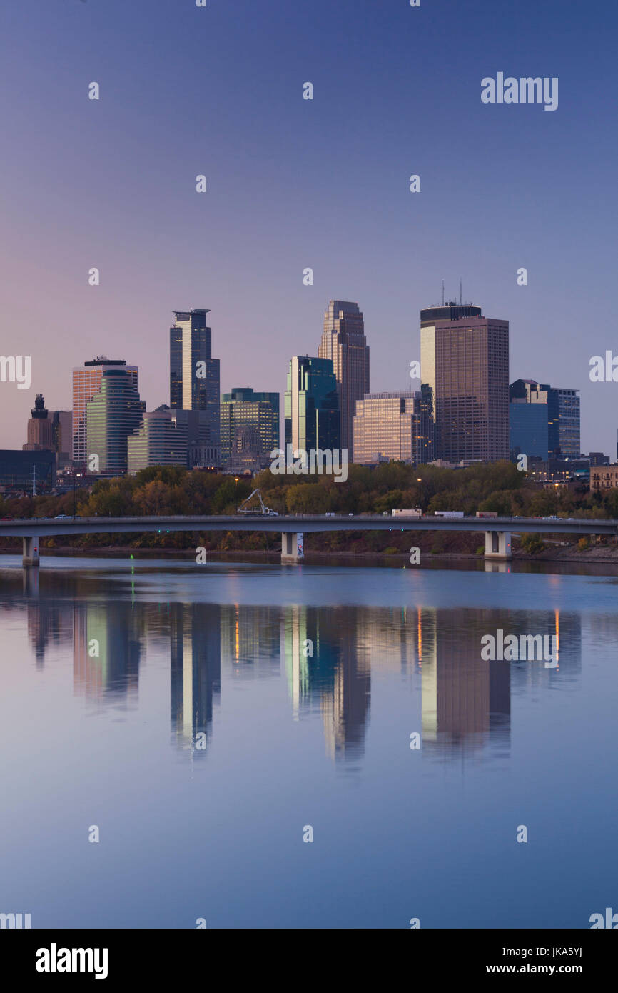 USA, Minnesota, Minneapolis, skyline from the Mississippi River, dawn ...