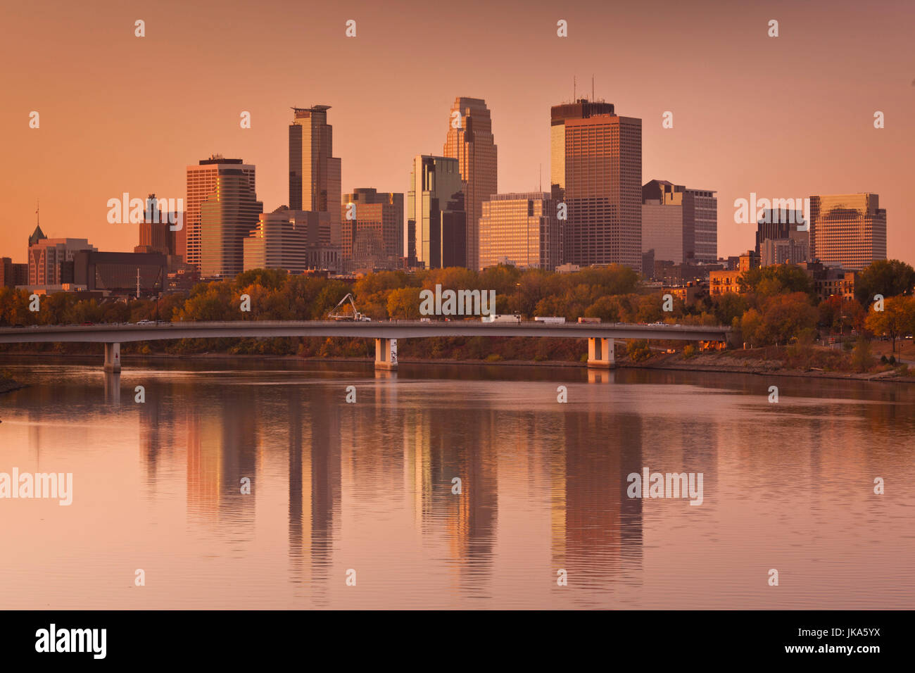 USA, Minnesota, Minneapolis, skyline from the Mississippi River, dawn ...