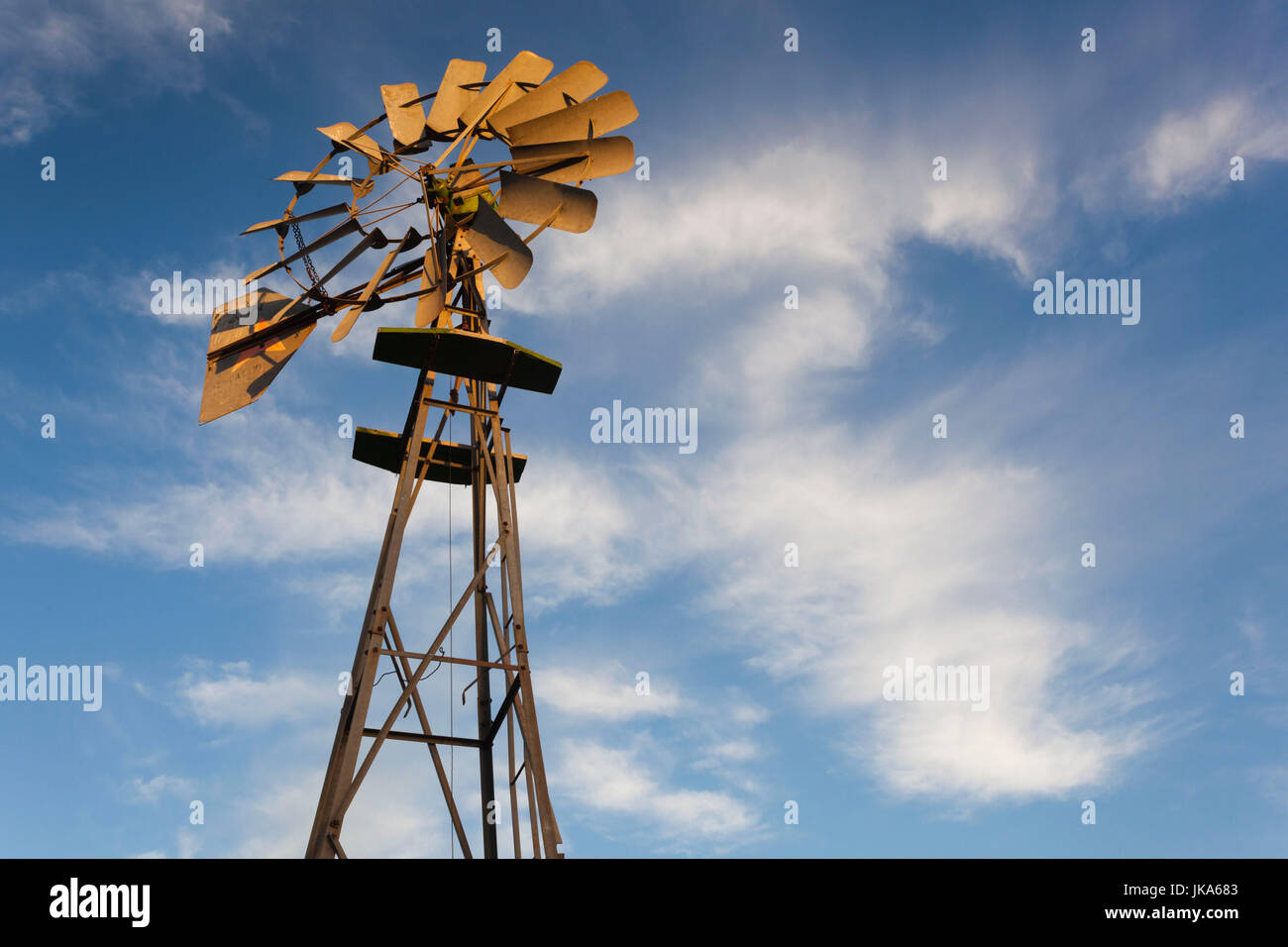 USA, Oklahoma, Elk City, vintage farm windmills, sunset Stock Photo - Alamy