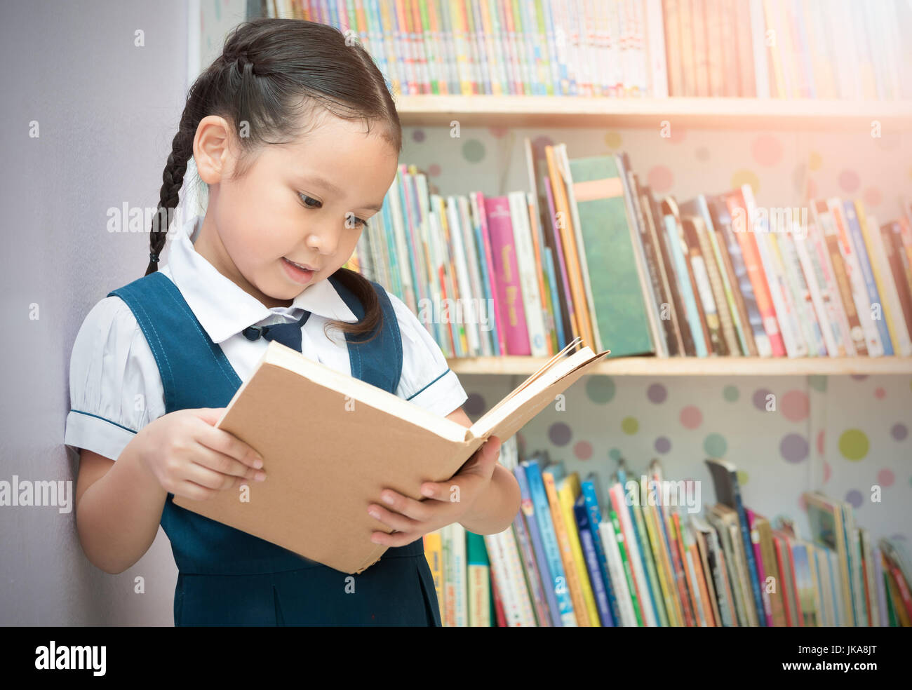 asian student cute girl reading book in library school, education ...