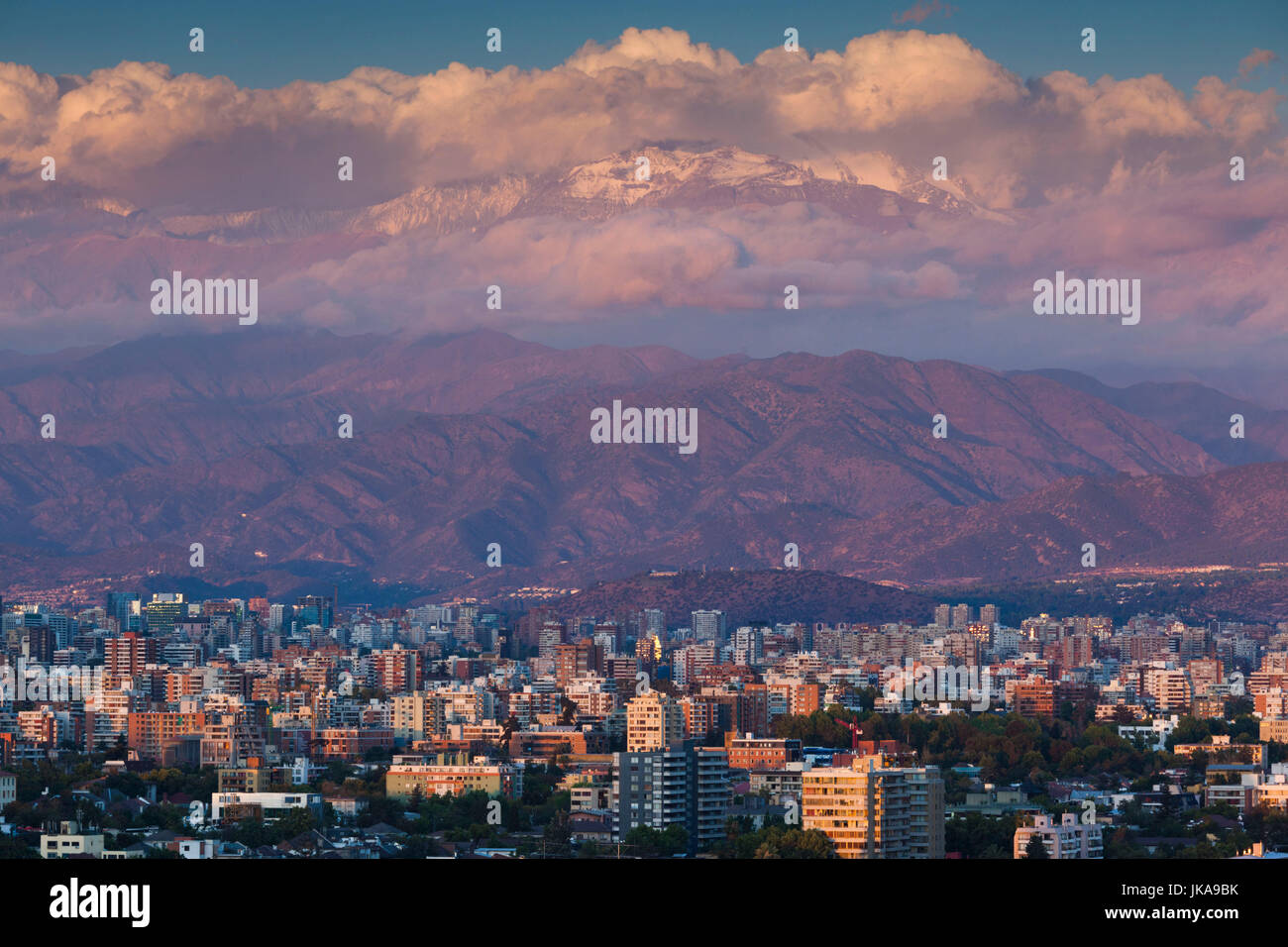Chile, Santiago, elevated city view towards the Andes Mountains, dusk ...