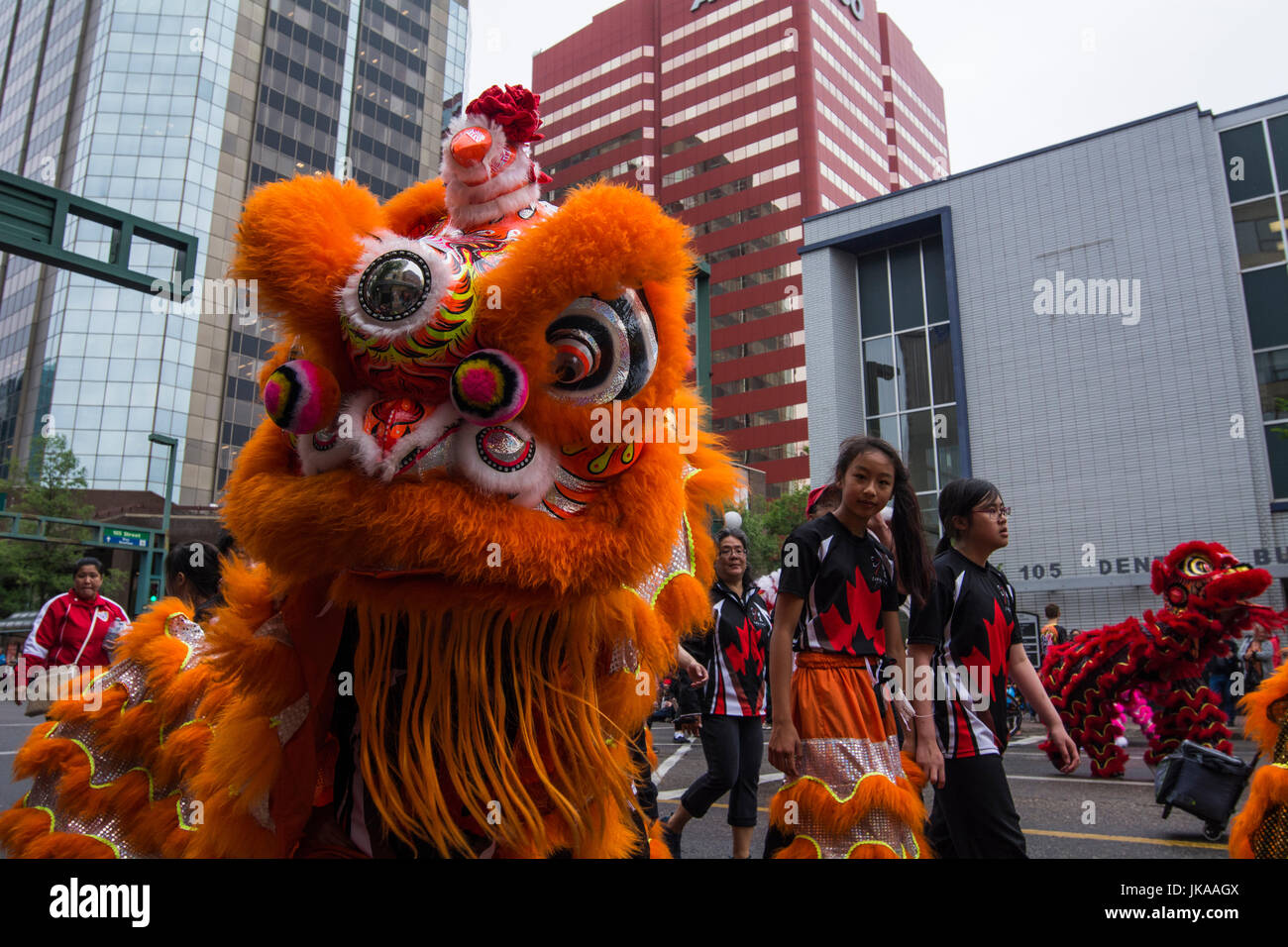 Chinese Dragon Dancers marching in K Days Parade 2017 on Jasper Avenue ...