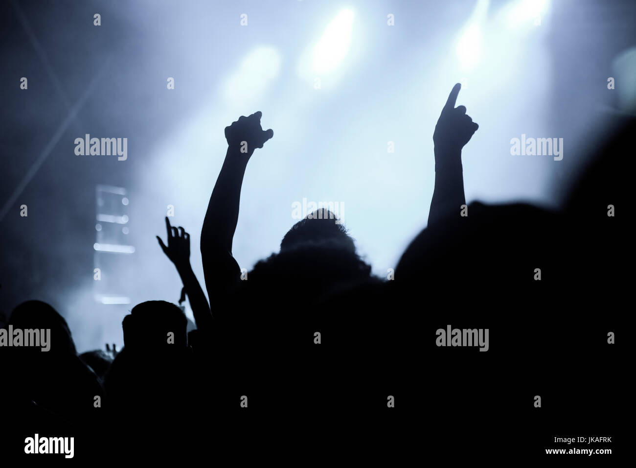 crowd with raised hands at concert - summer music festival Stock Photo ...