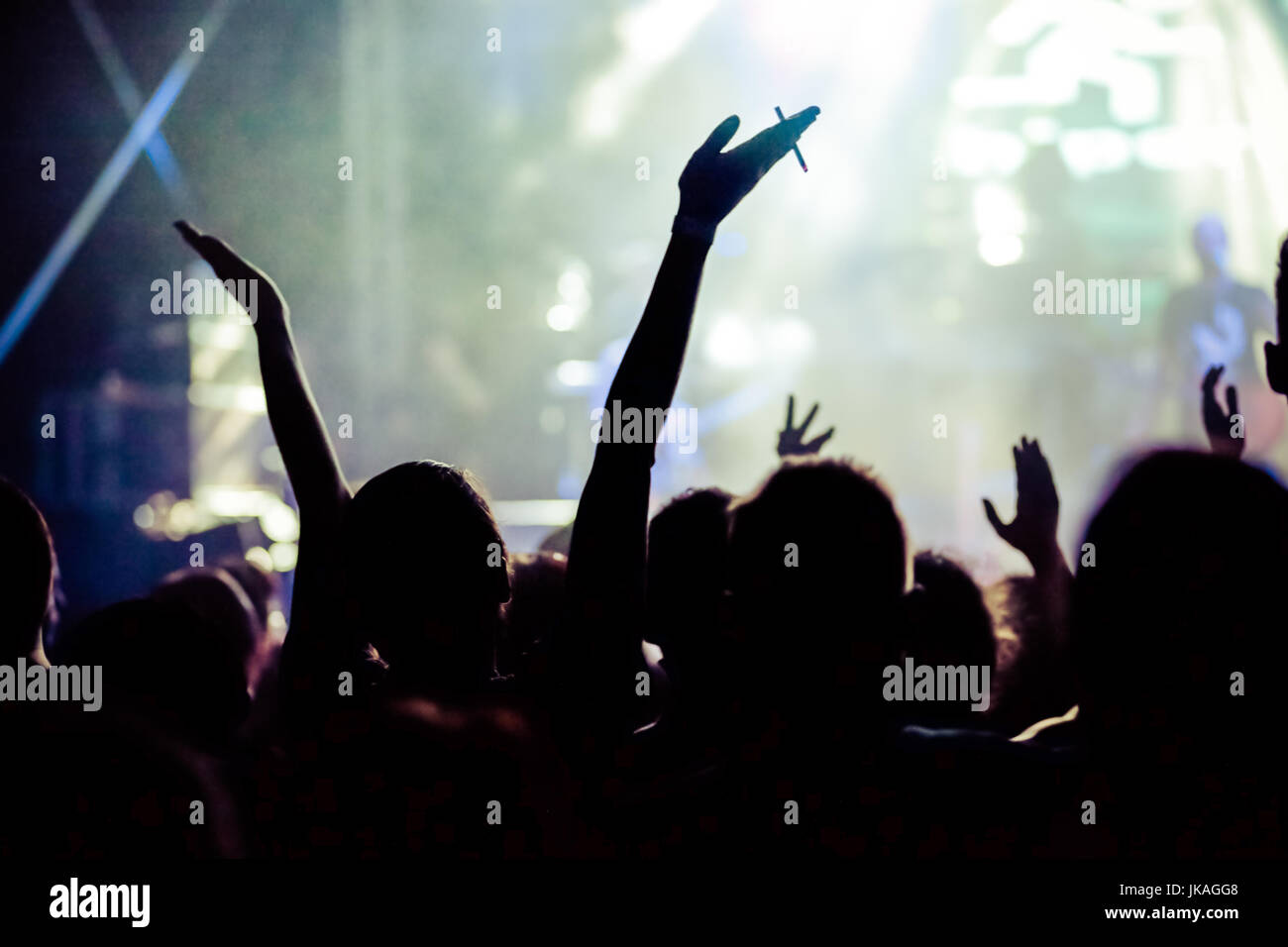 crowd with raised hands at concert - summer music festival Stock Photo ...