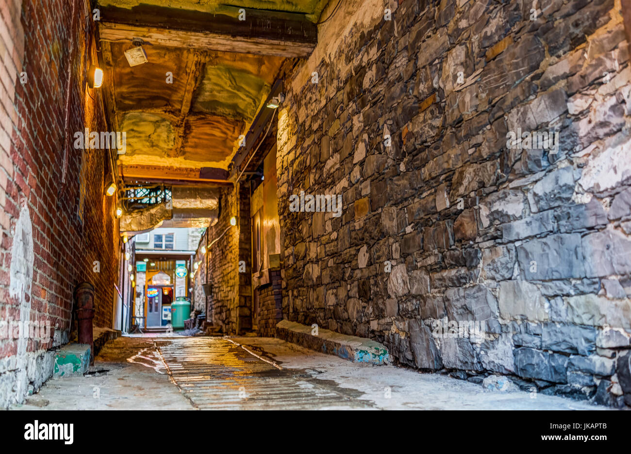 Old town street narrow dark brick alleyway or alley with path Stock ...