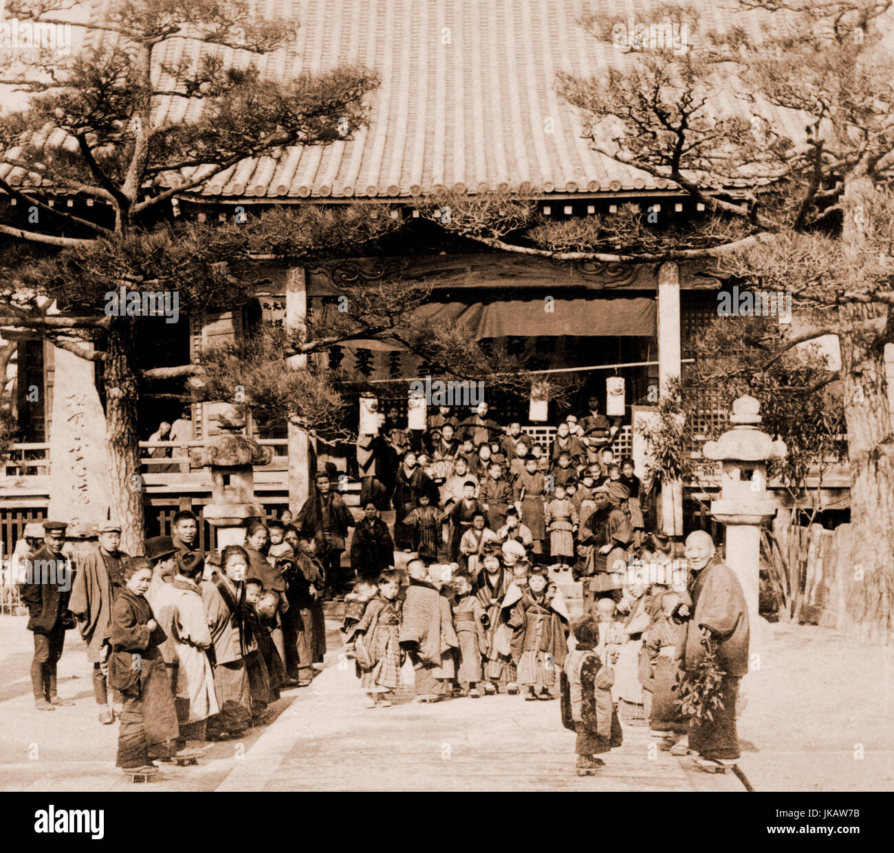People in traditional dress leaving the temple at Hiogo, Japan in 1896 ...